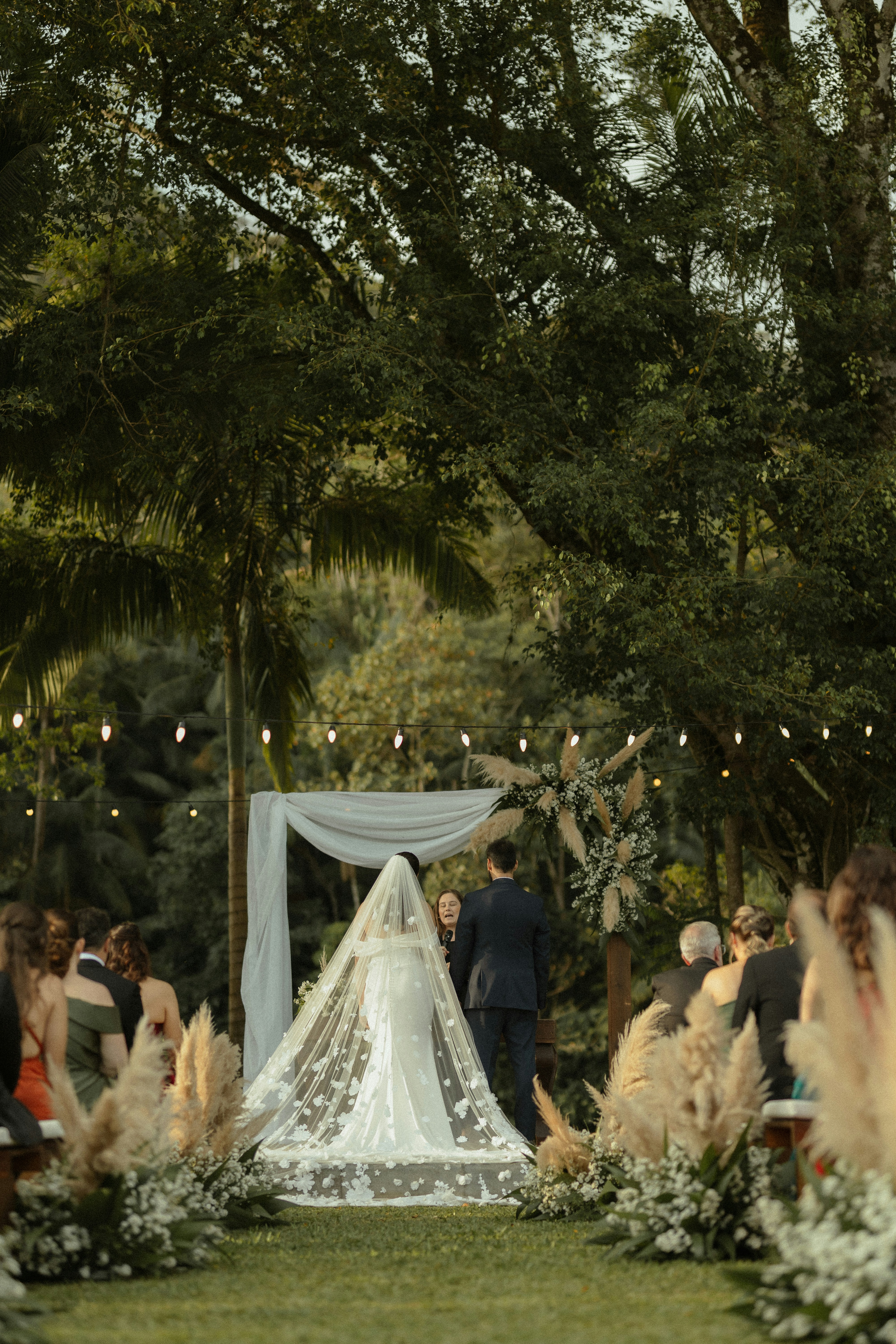 Vows Under Firefly Lights: A Garden Ceremony Framed by Quiet Grace