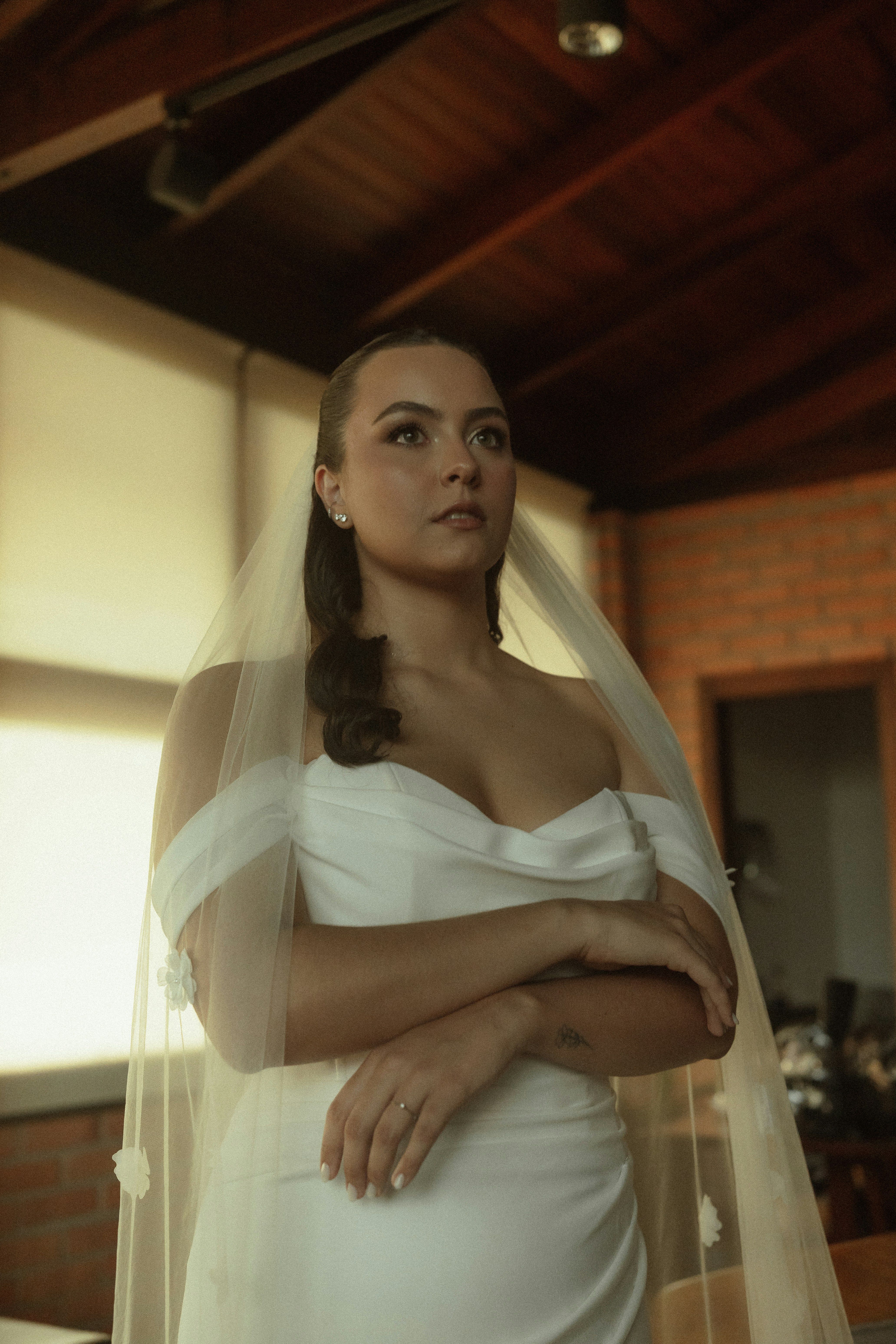 Bride in Soft Light: Quiet Confidence Under an Open Roof