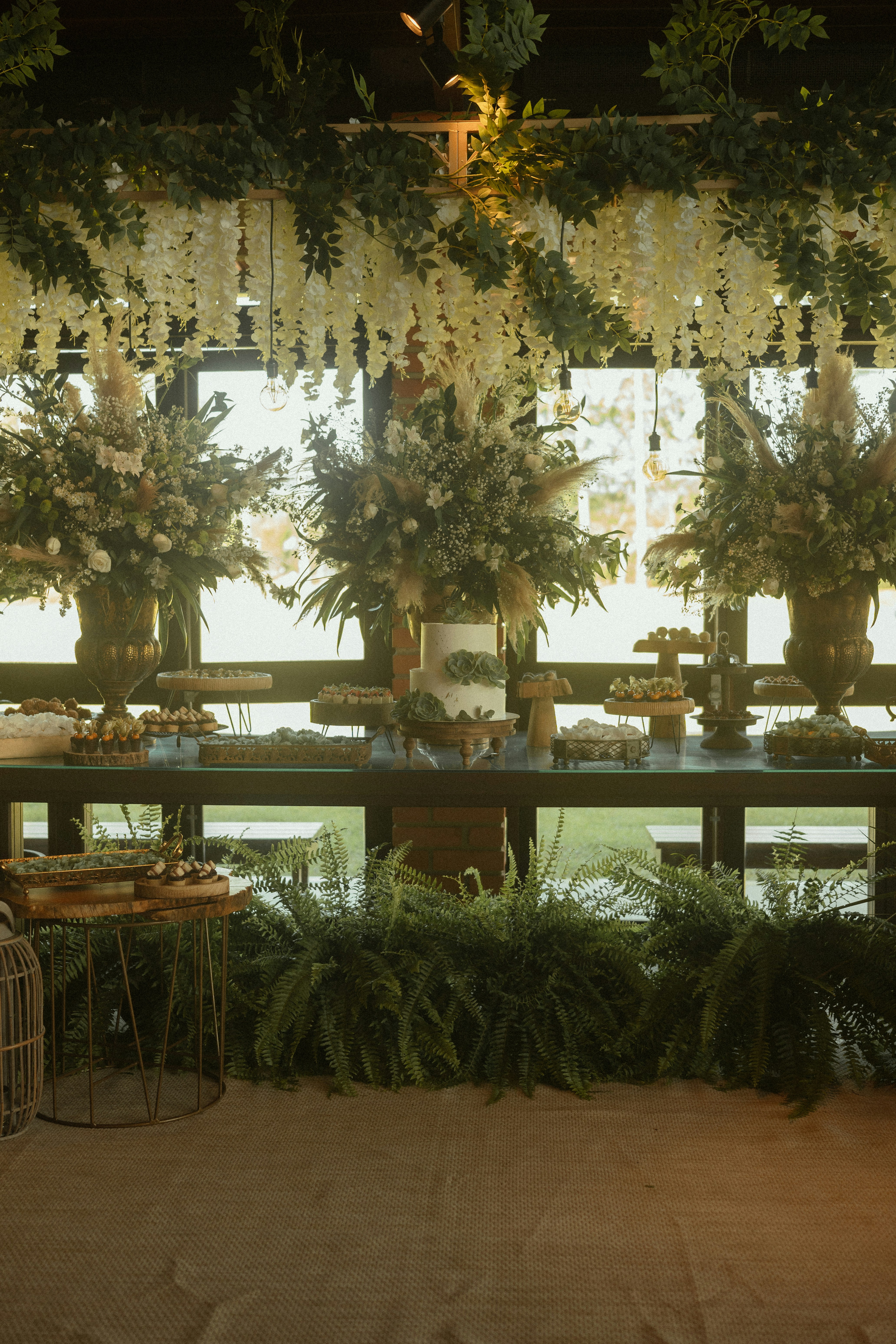 Floral banquet under cascading greens