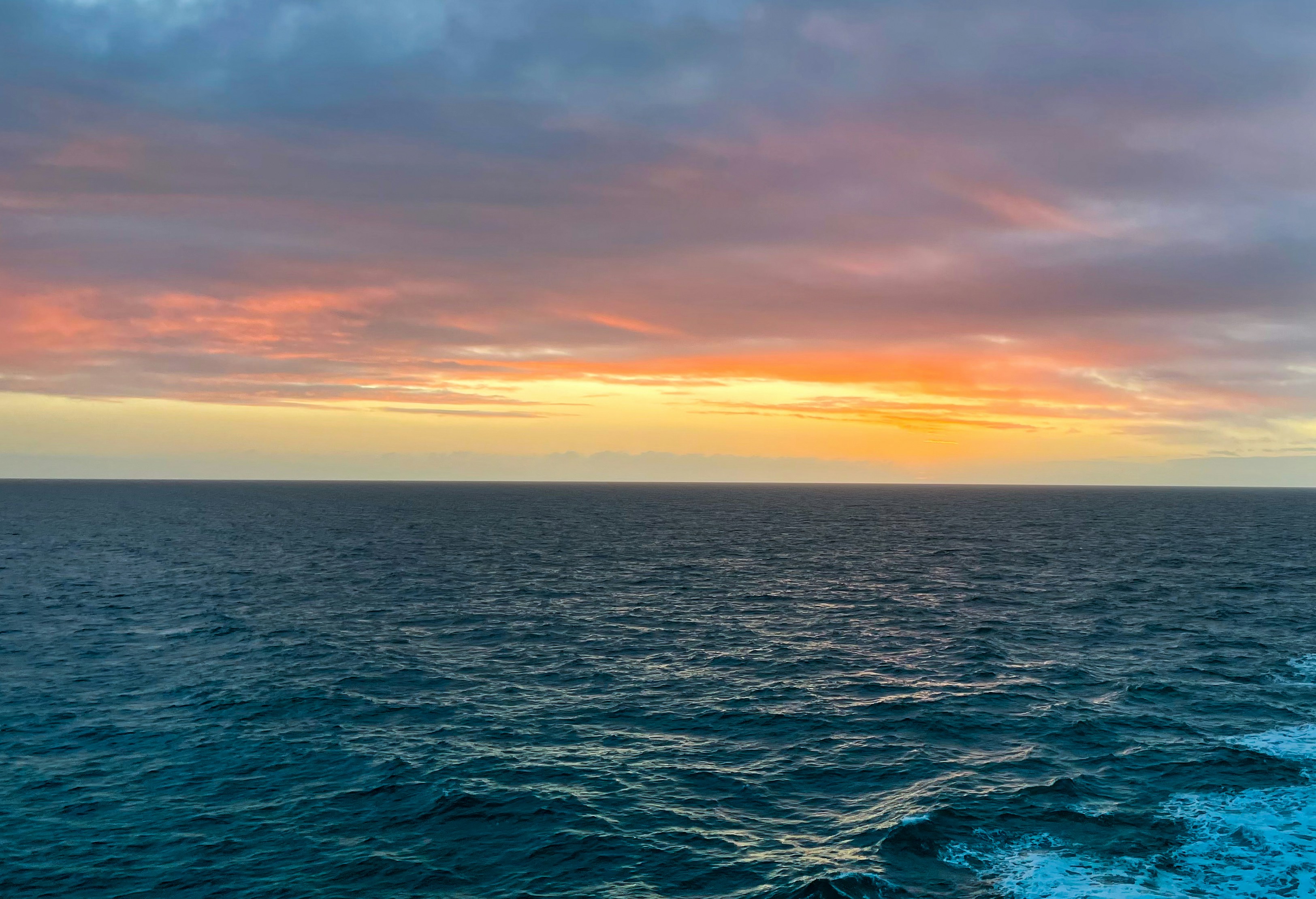 Horizon Fire: A Quiet Seascape at Sunset