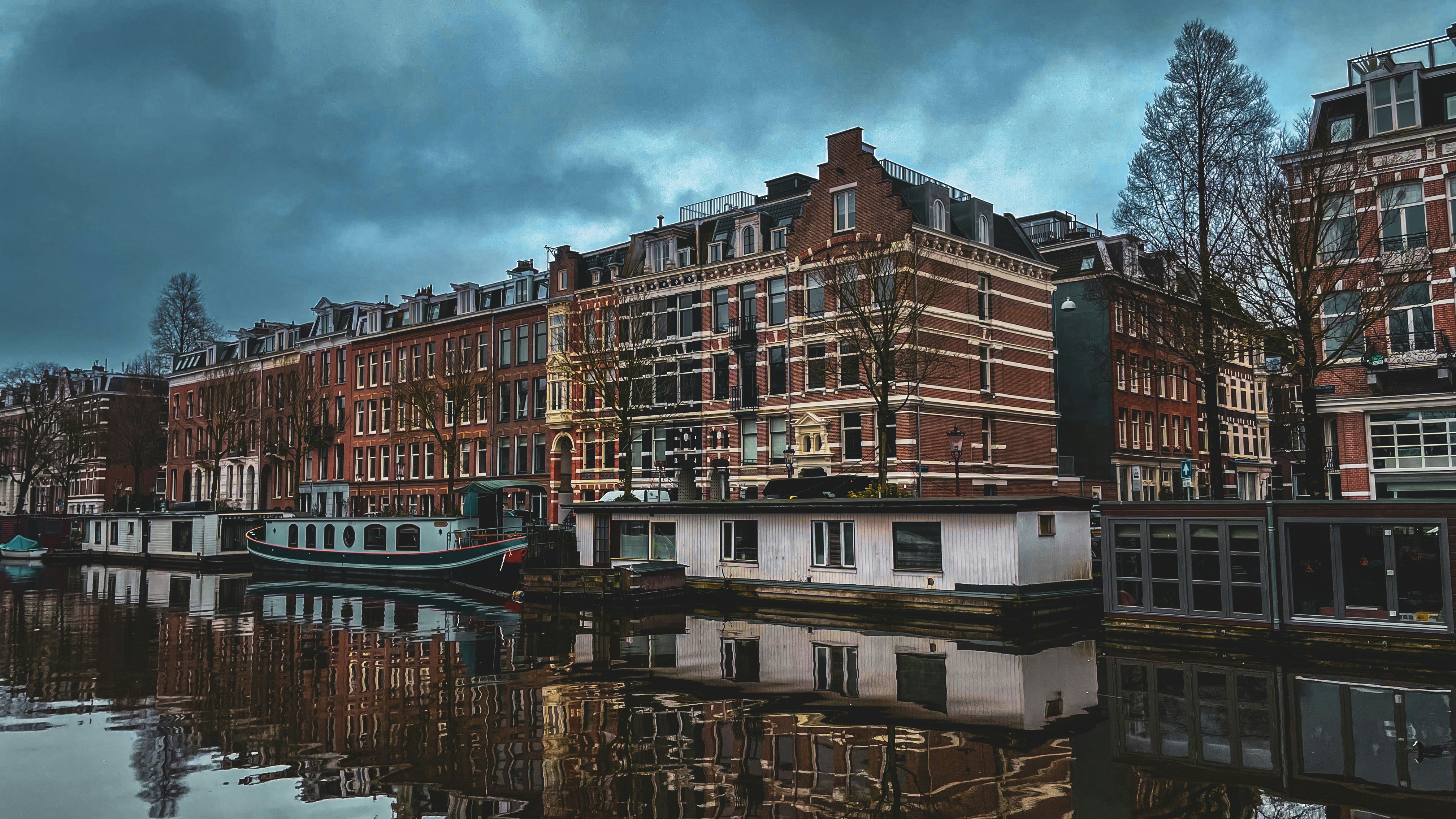Canalfront in Amsterdam: Echoes of Brick and Water