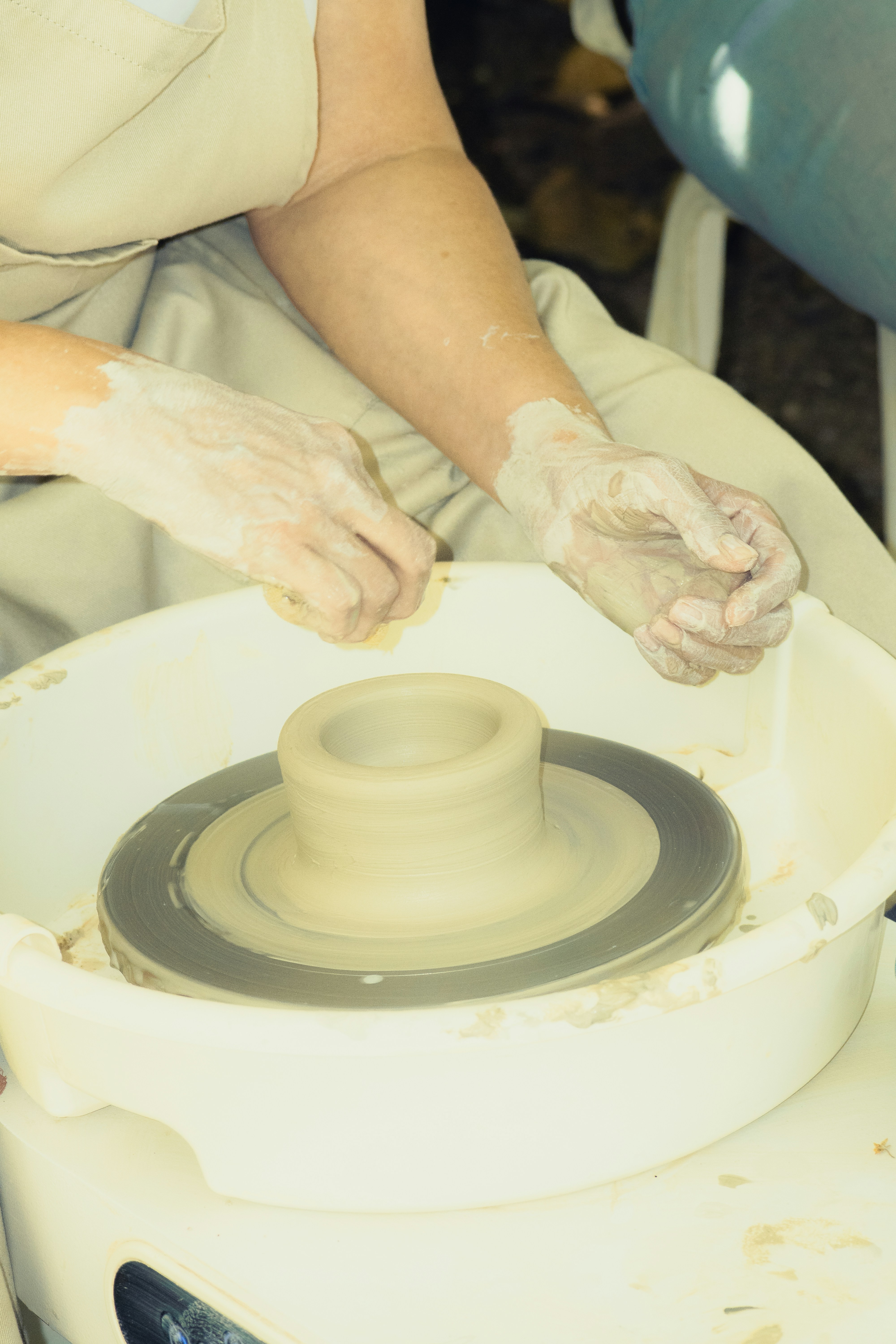 Hands in Clay: Crafting a Pot on the Pottery Wheel
