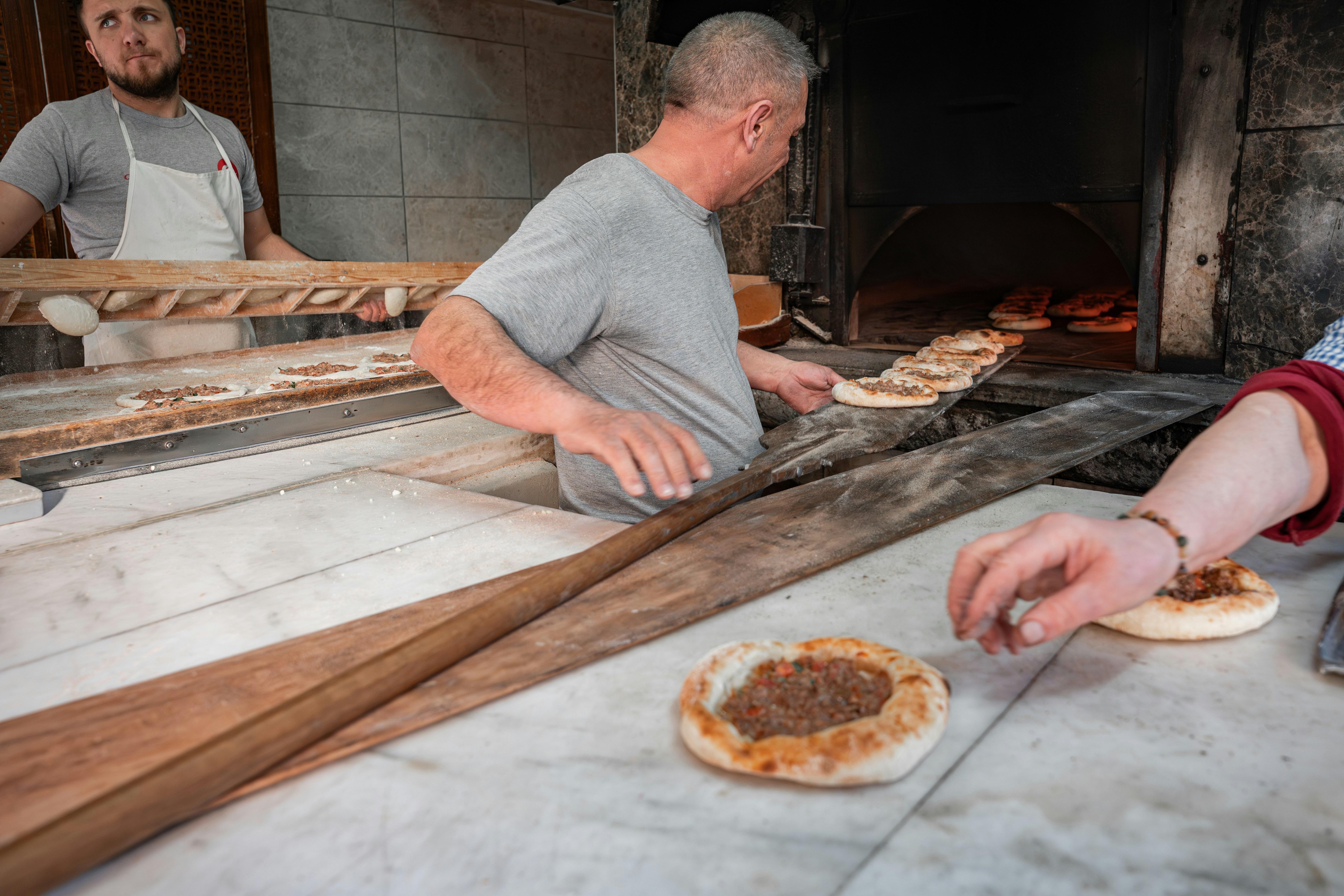Rolling Ovens and Rising Bread: Behind the Marble Counter