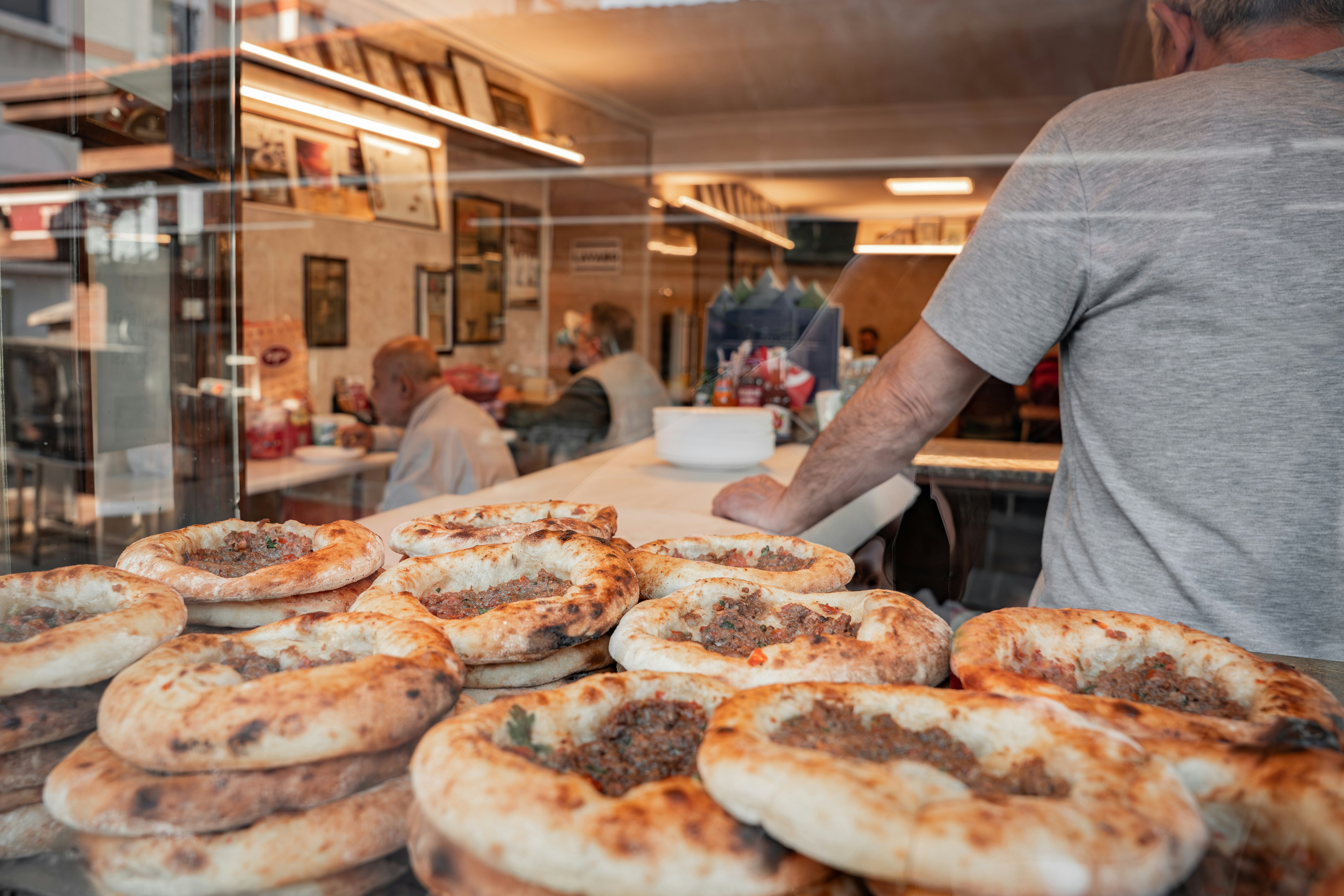 Turned Solely by Glazed Ring Pastries: A Busy Bakery Window