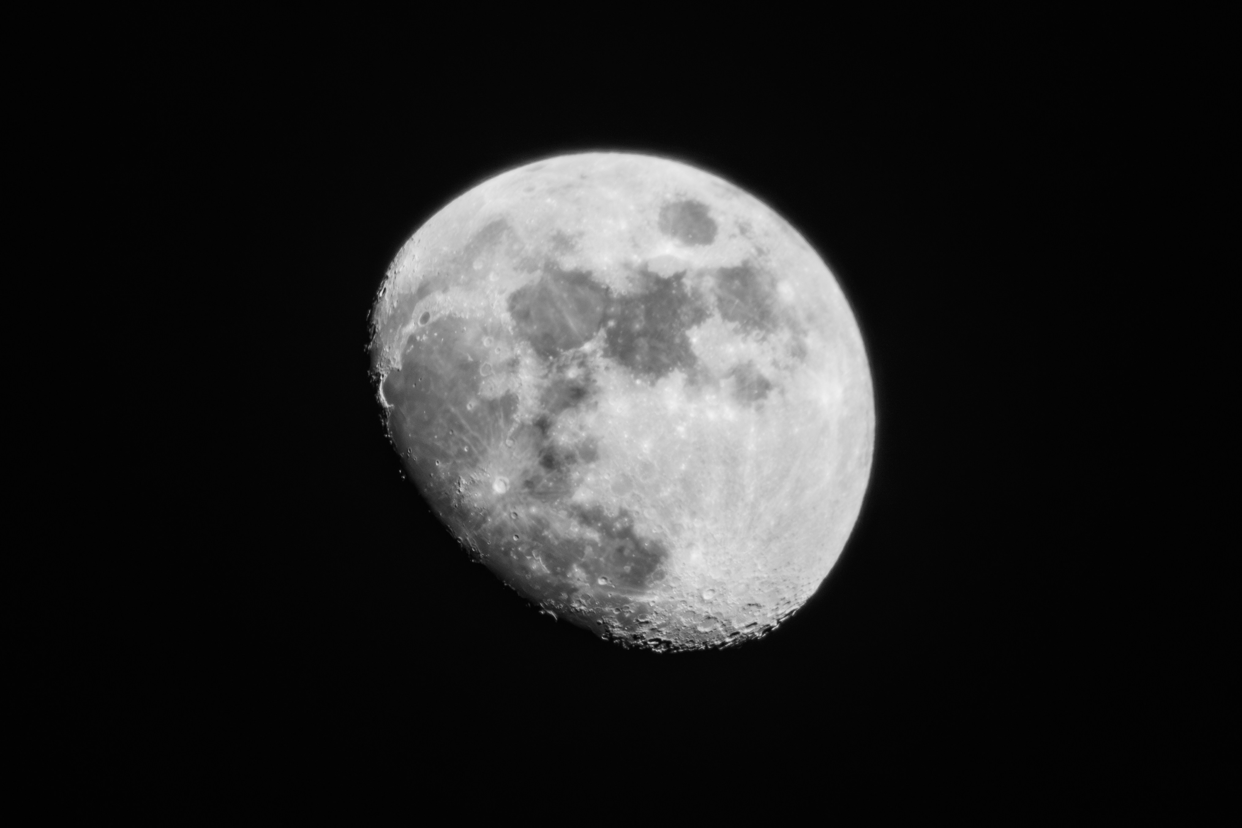 Luminous Orb: The Moon’s Craters in a Quiet Night