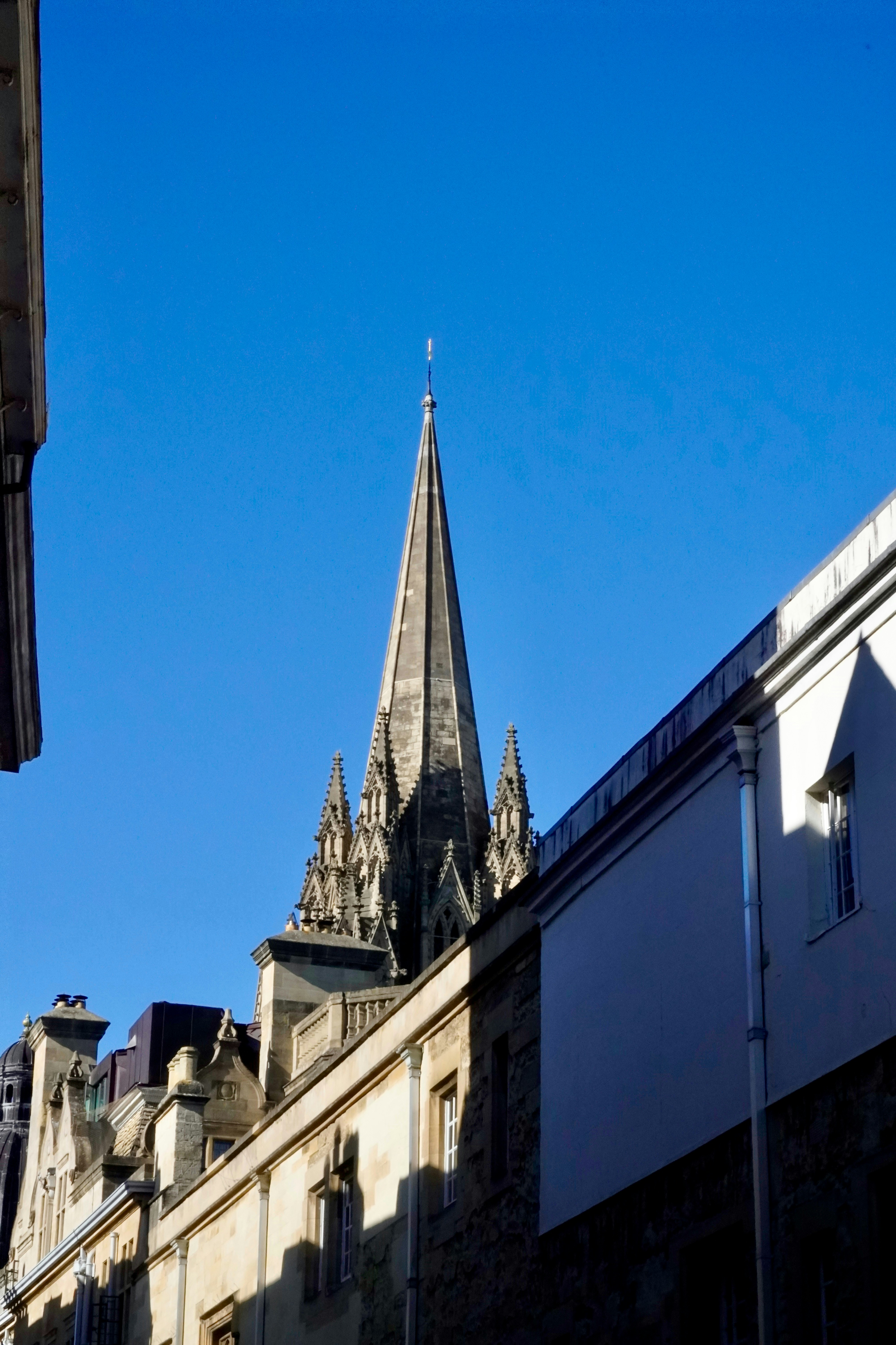 Gothic Spire Piercing a Clear Sky