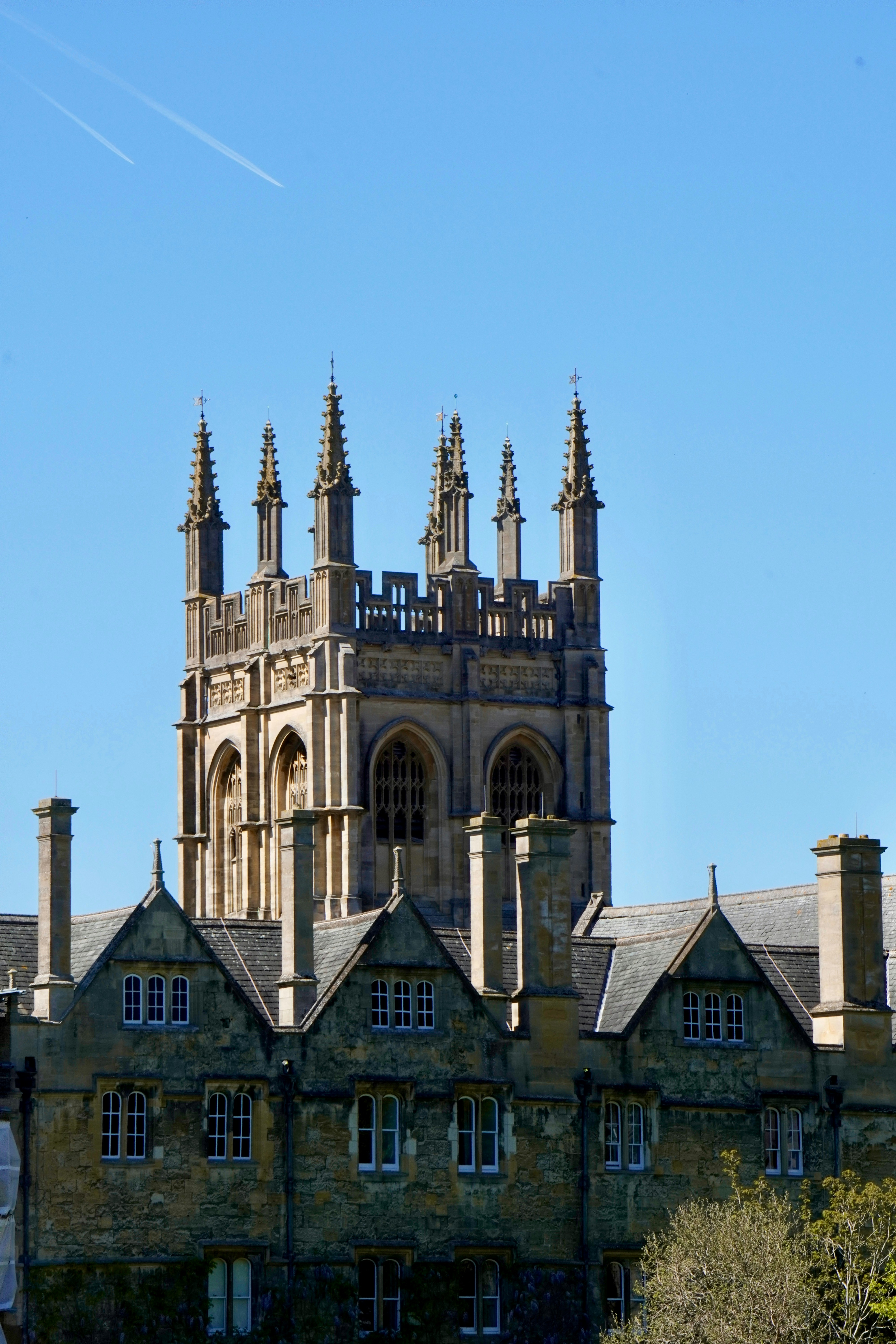 Gothic Spire Rising Above Stone Manor