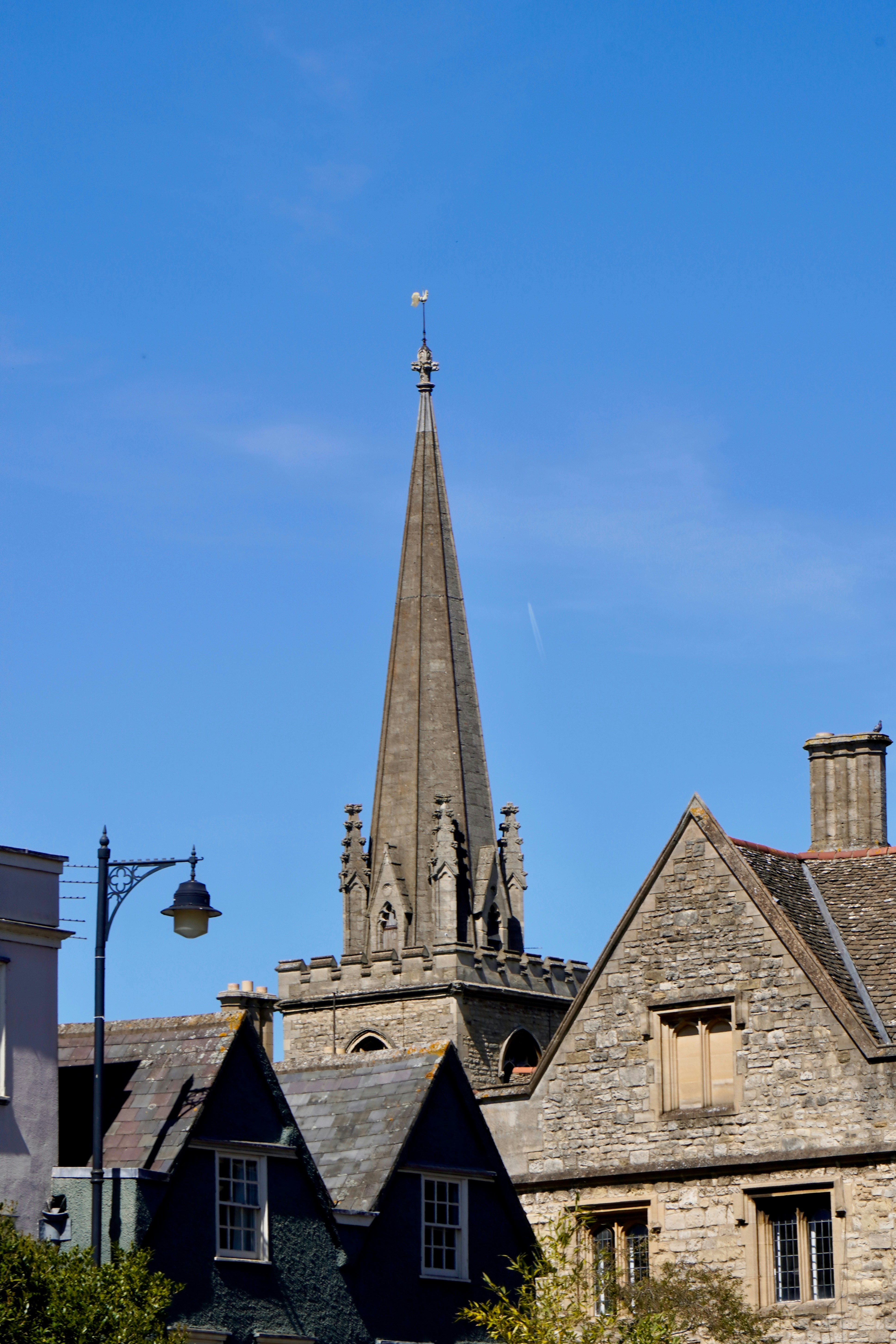 Gothic Spire Rising Above Village Roofts
