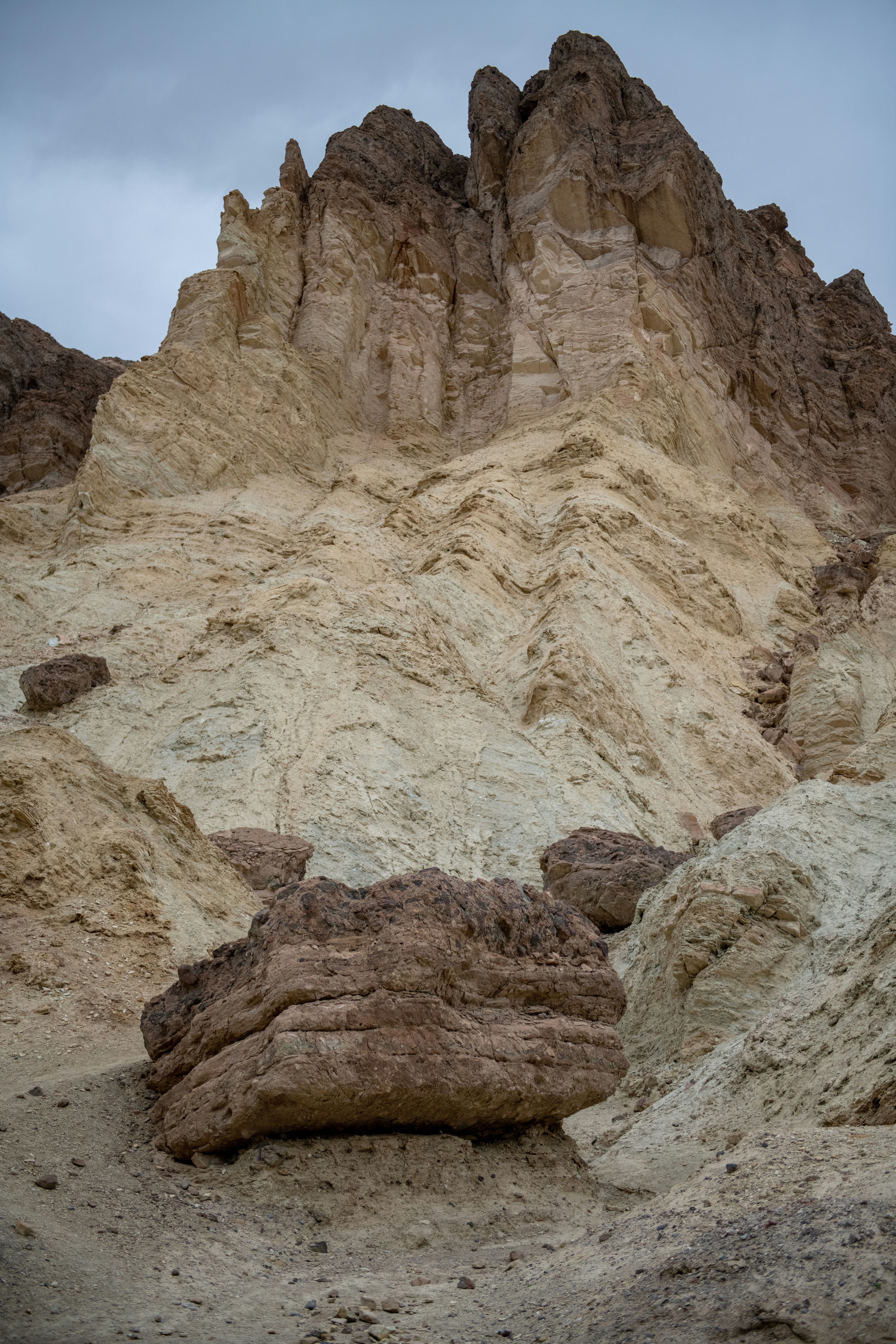 Layered Desert Monolith Beneath a Quiet Sky