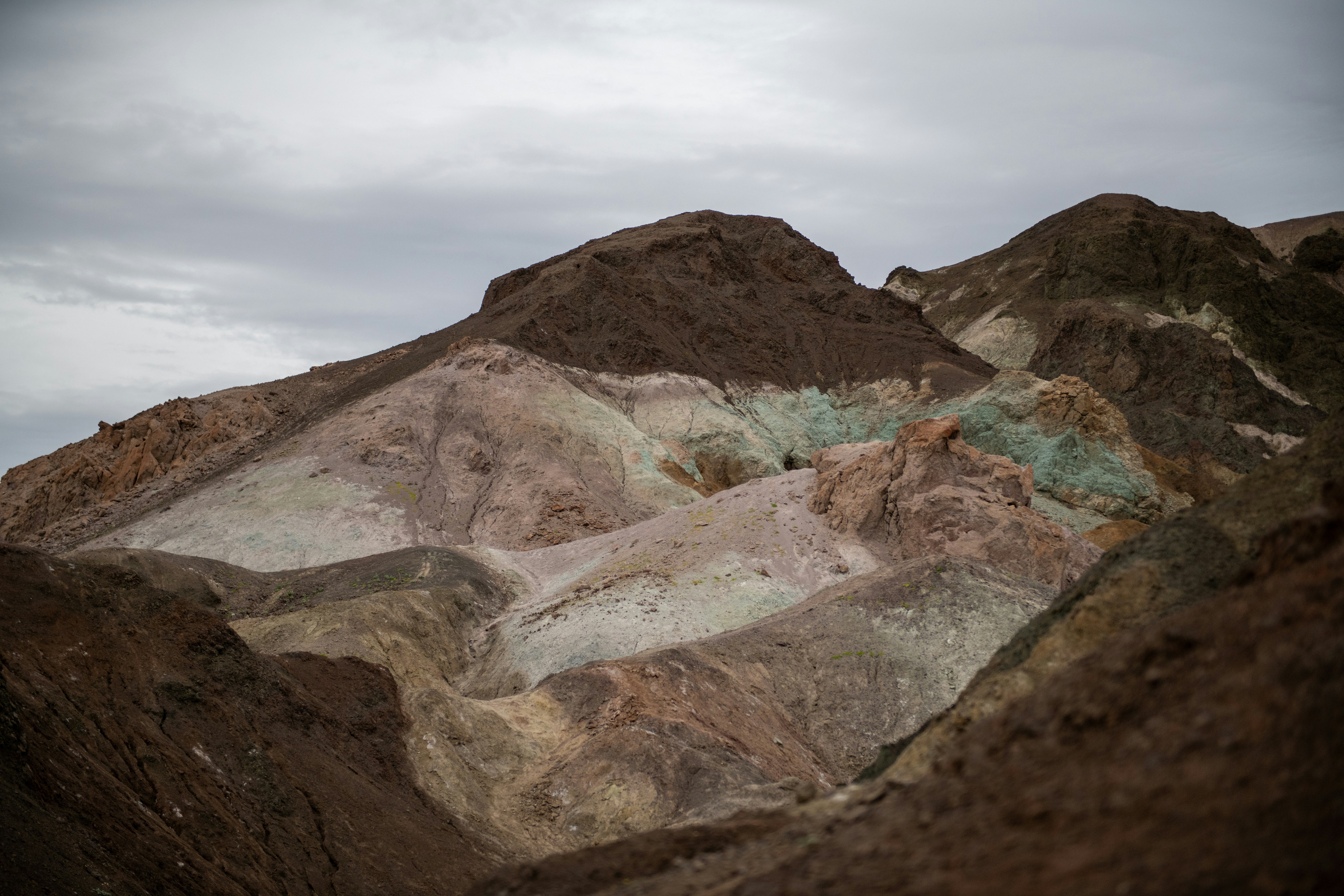 Colorful Lunar Hillside Under a Quiet Sky