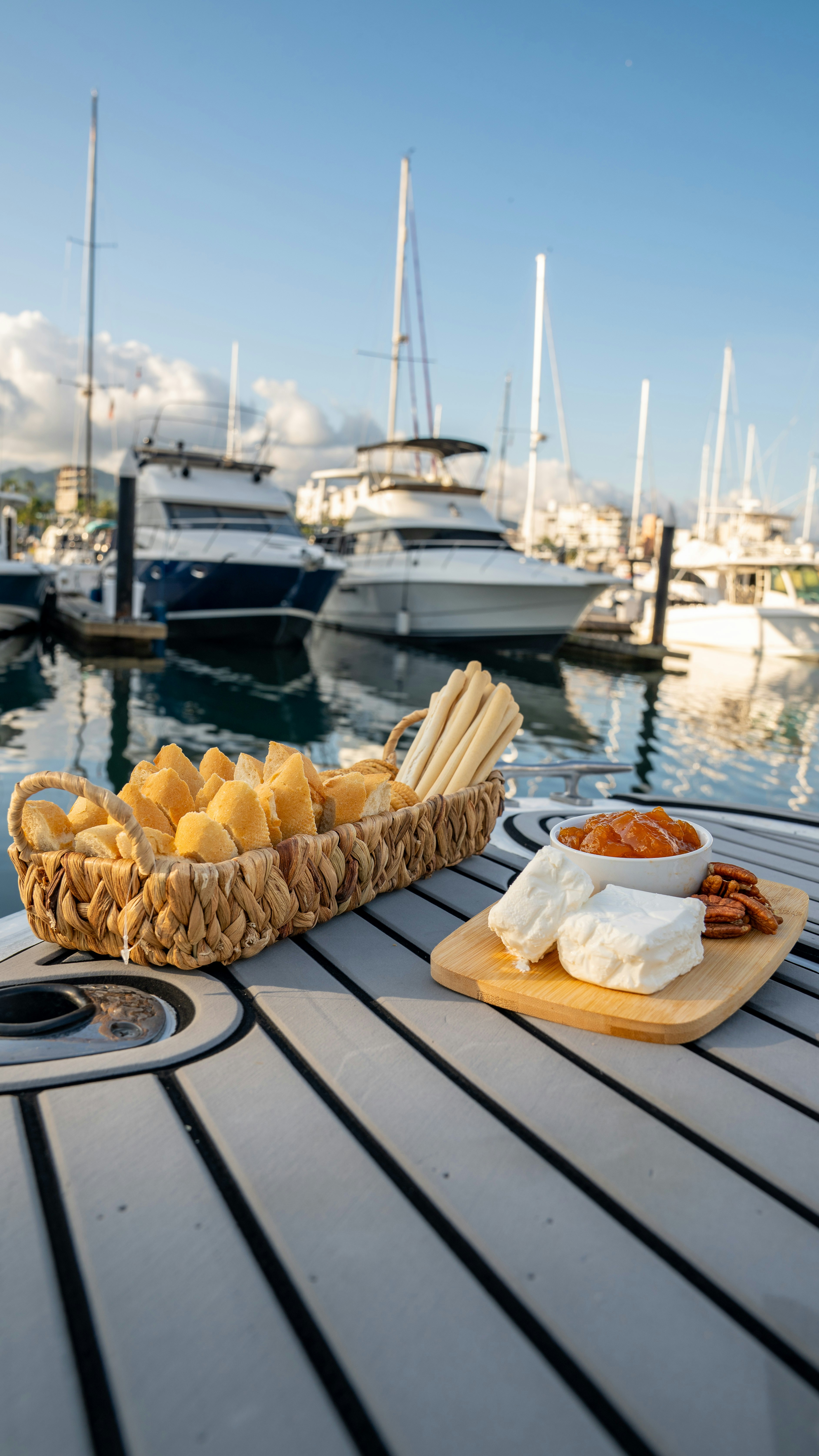 Charcuterie on Deck with Yachts in the Sunset Marina