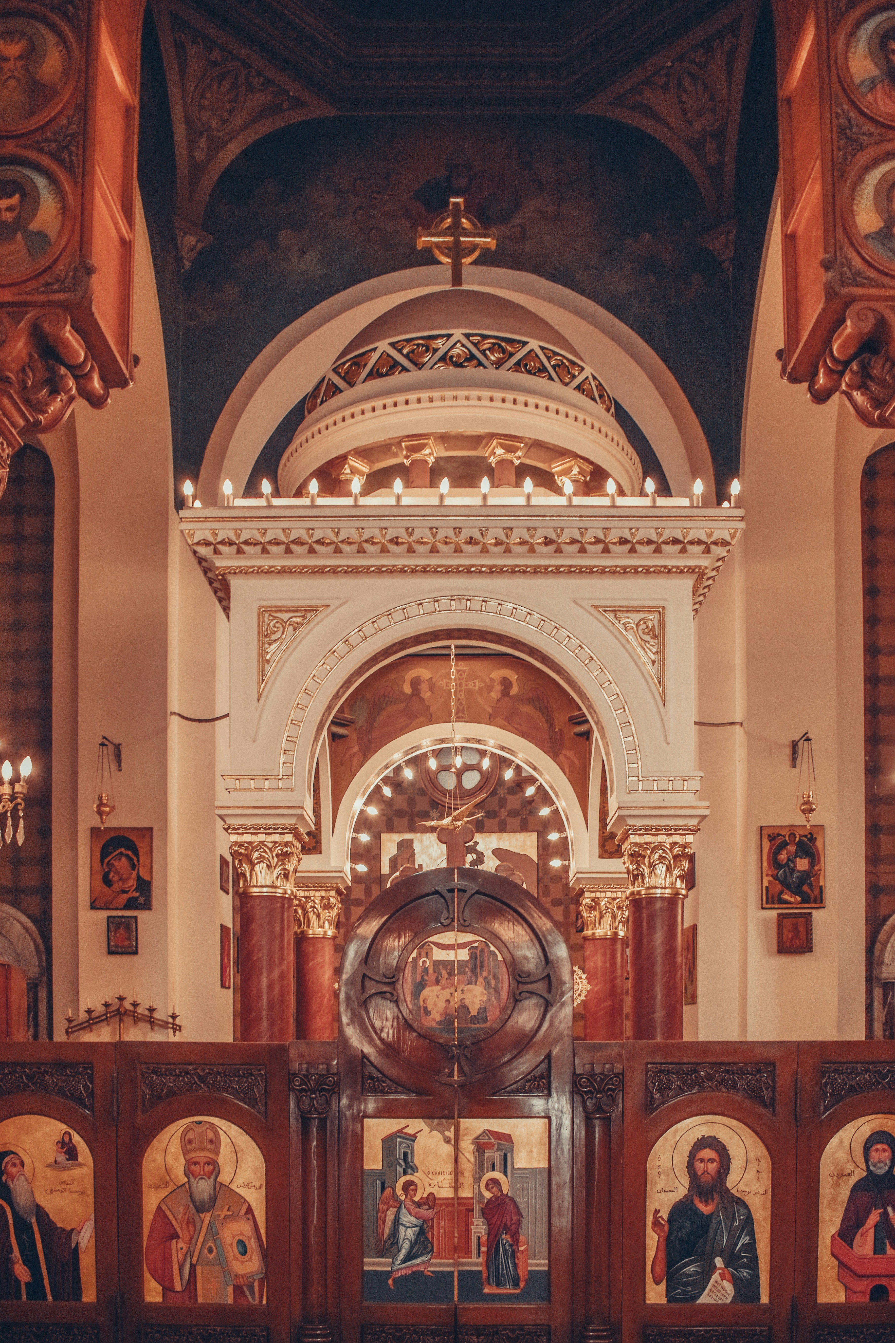 Ornate Orthodox Interior: Sacred Archway Framed by Icon Panels
