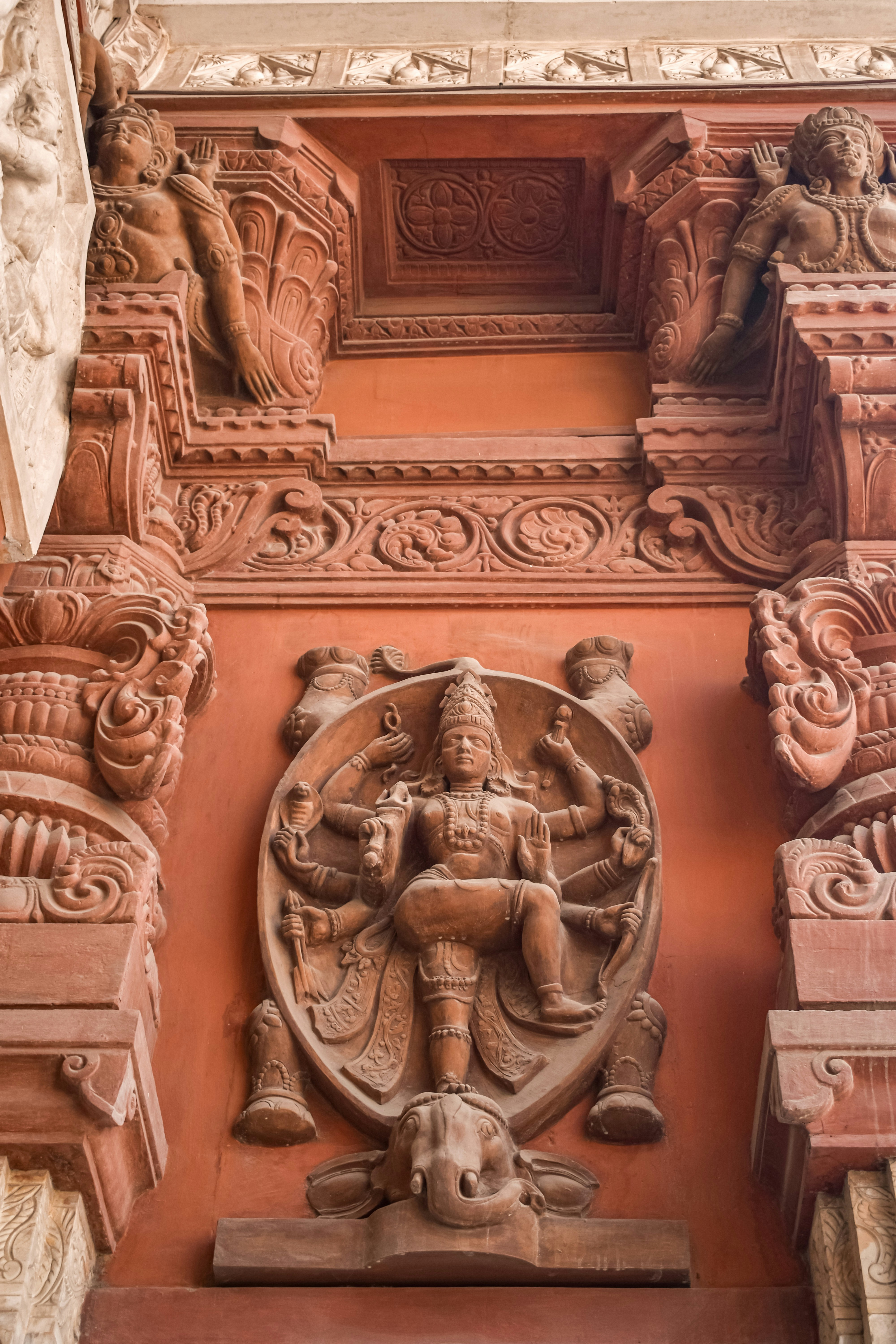Carved Deity Rising from Frieze: A Bazaar of Terracotta Sculptures