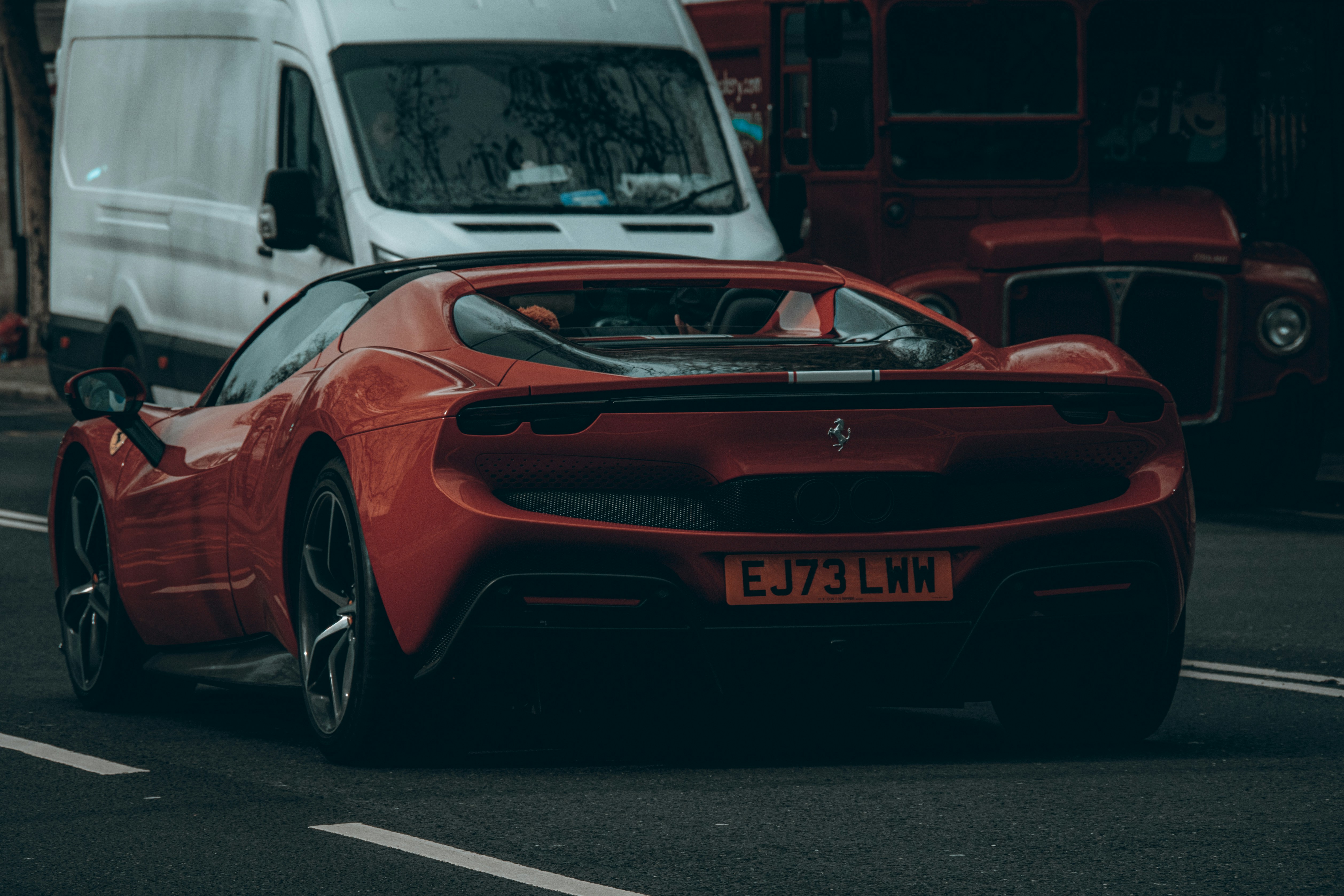 Red Convertible in a Quiet Street: Power and Pose