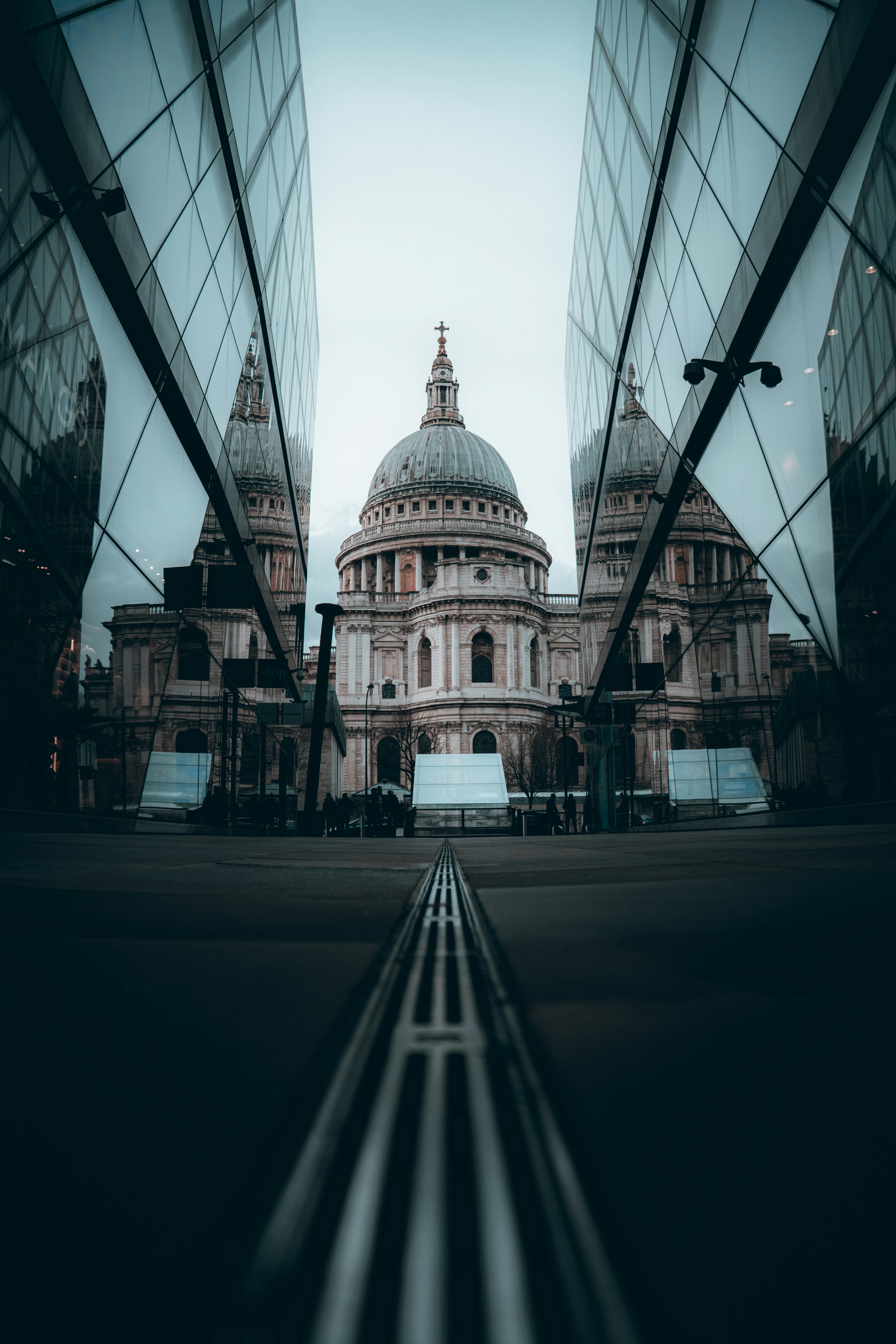Centered Triumph: The Dome of St. Pauls Framed by Modern Glass