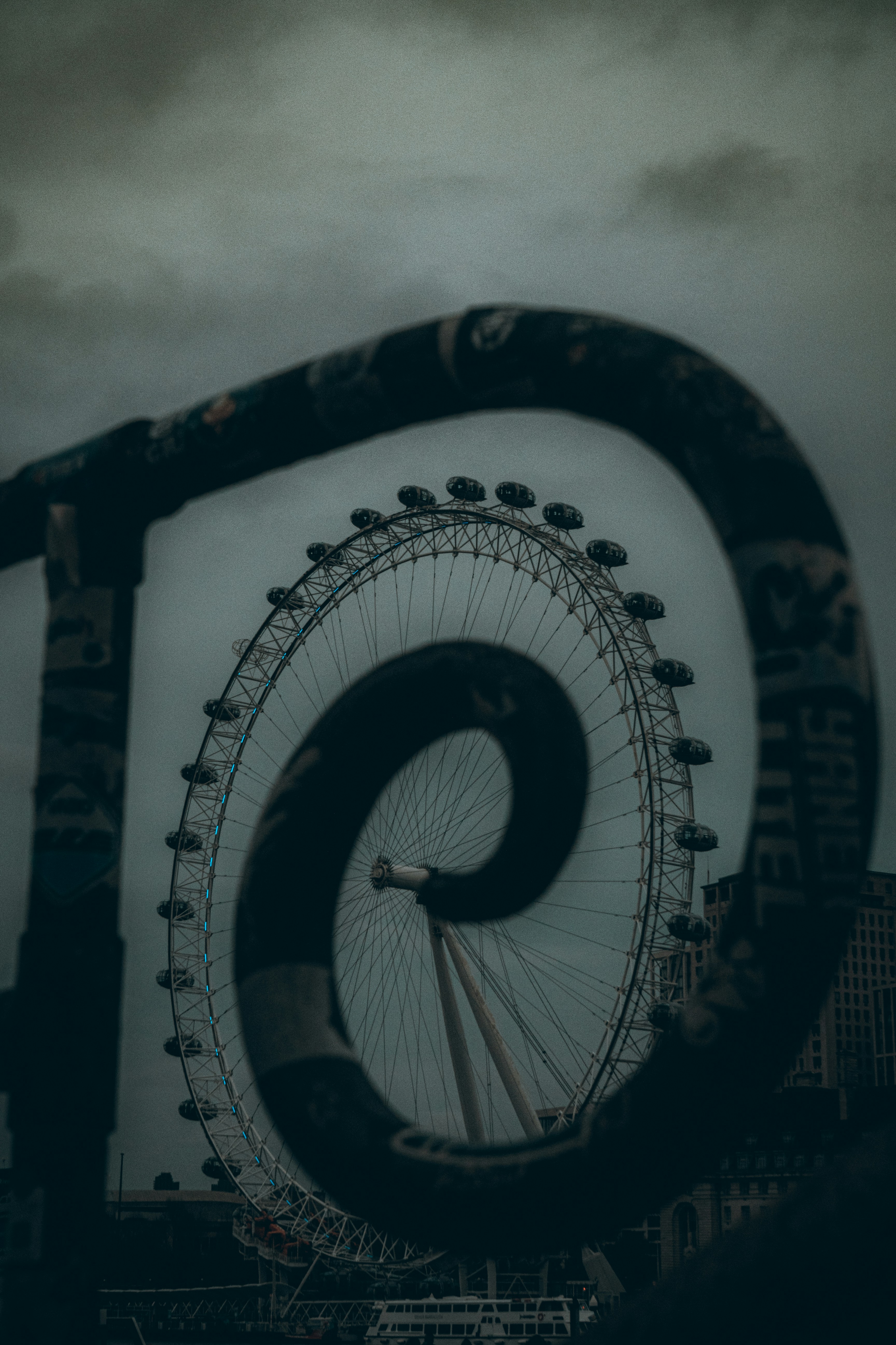 Spiral of the Giant Wheel: An Umber Frame Through a Ring
