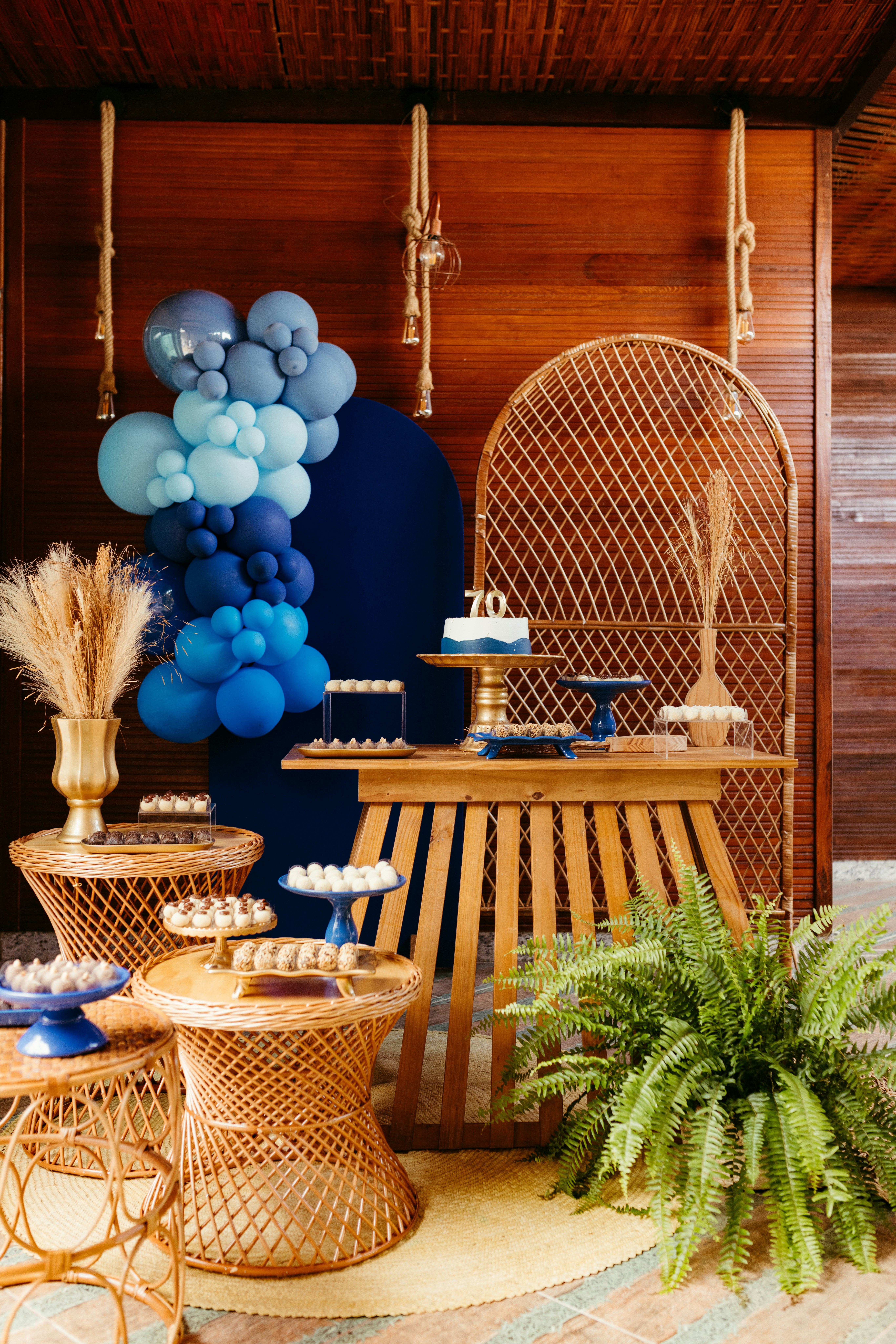 Blue Balloon Bouquet Backdrop with Wooden Table Celebration