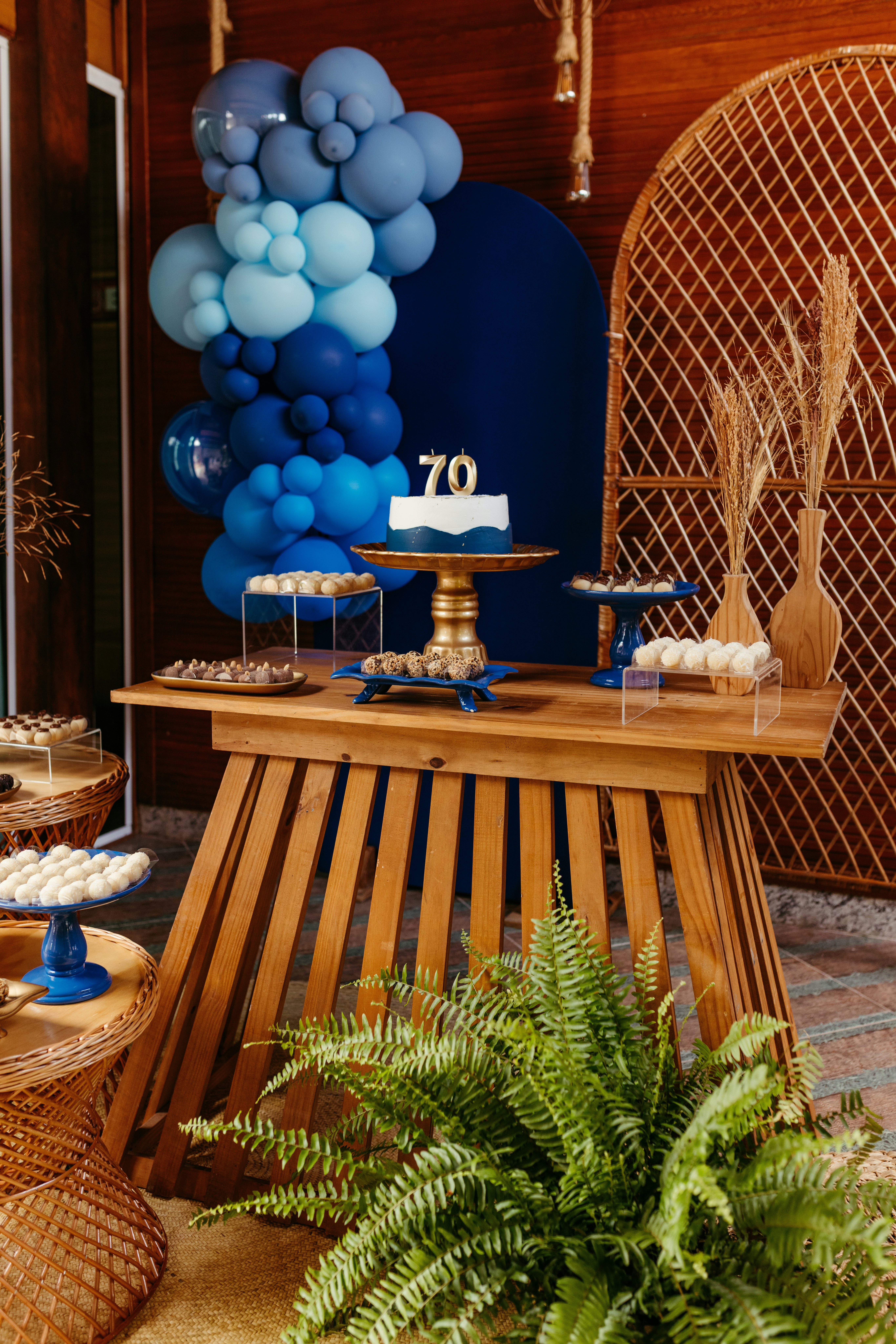 Blue Cascade of Celebration: A 70th Birthday Table Scene