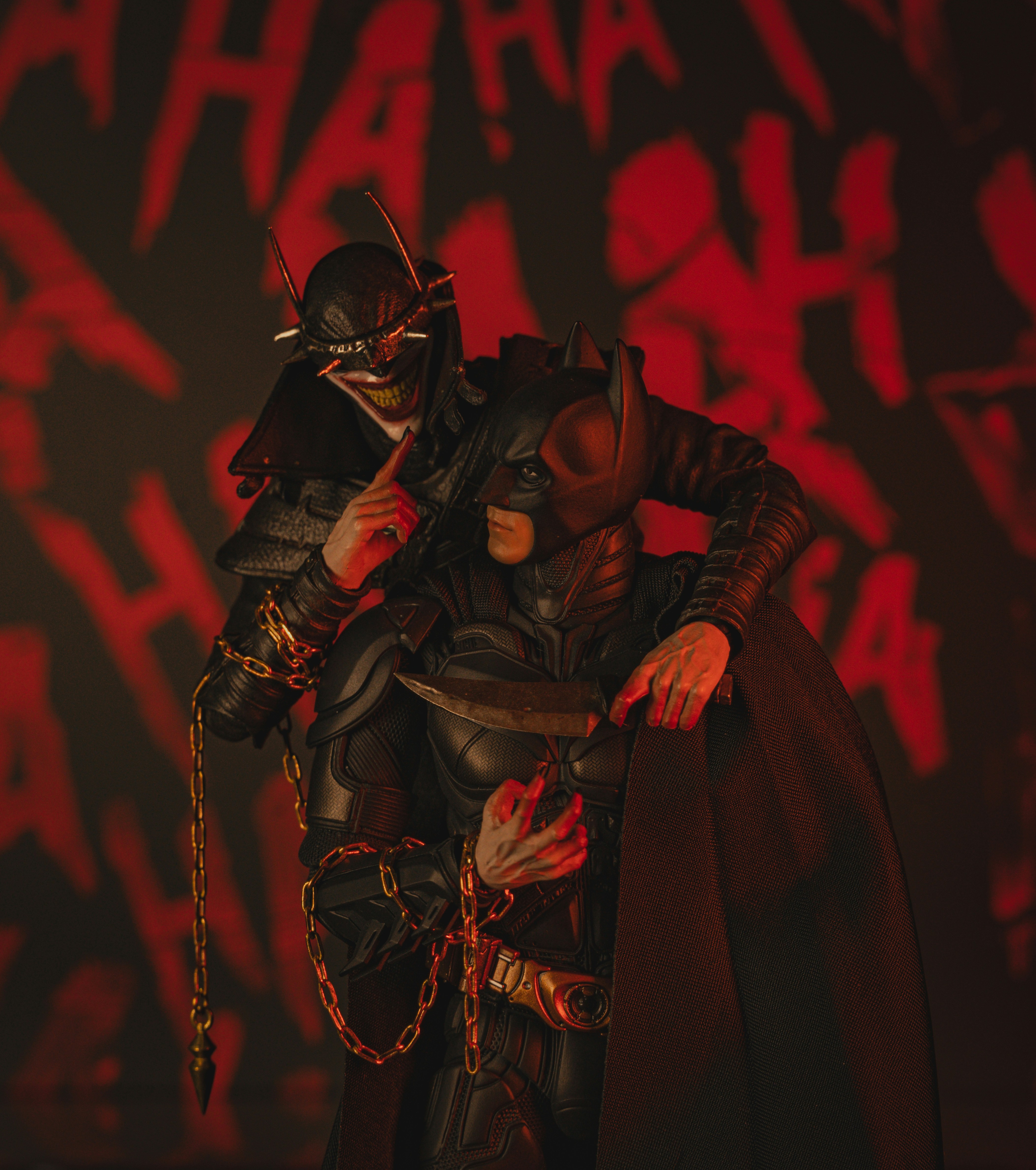 Dark Duo: Batman and a Mysterious Stranger in a Blood-Red Backdrop