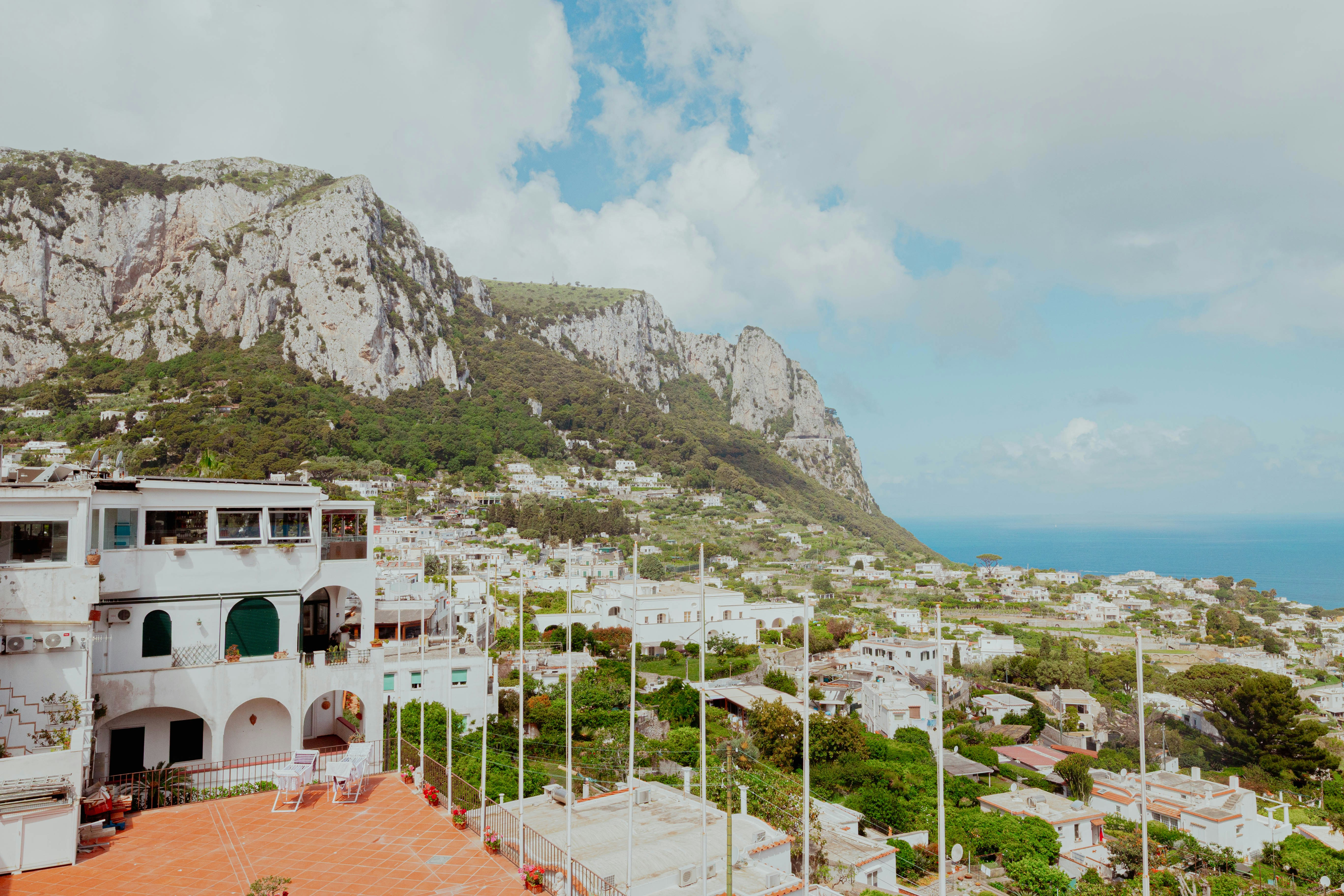 Terraced Seaside Village Under Turquoise Sky