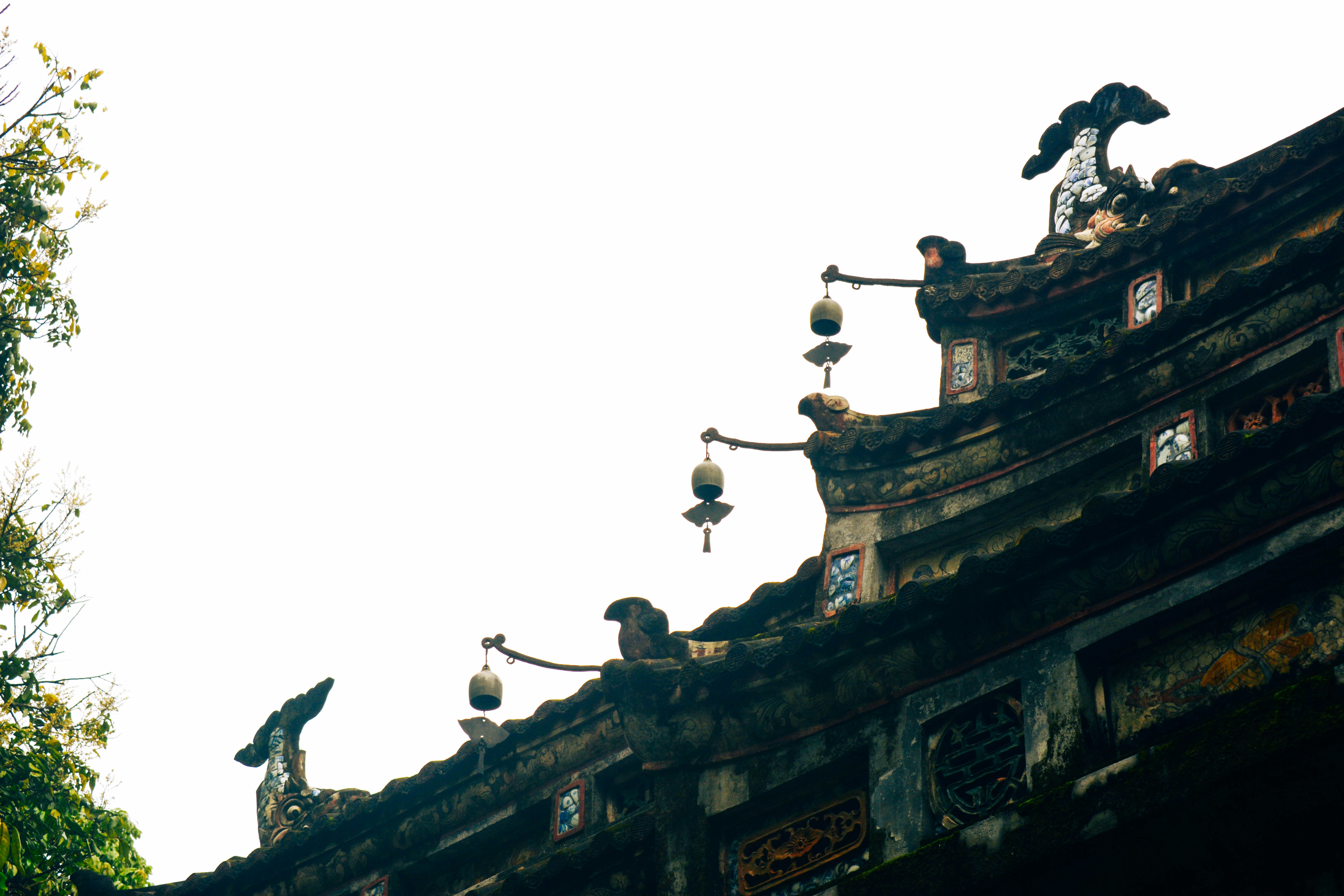 Dragon-Wired Rooflines: Lanterns and Crest on an Ancient Eave