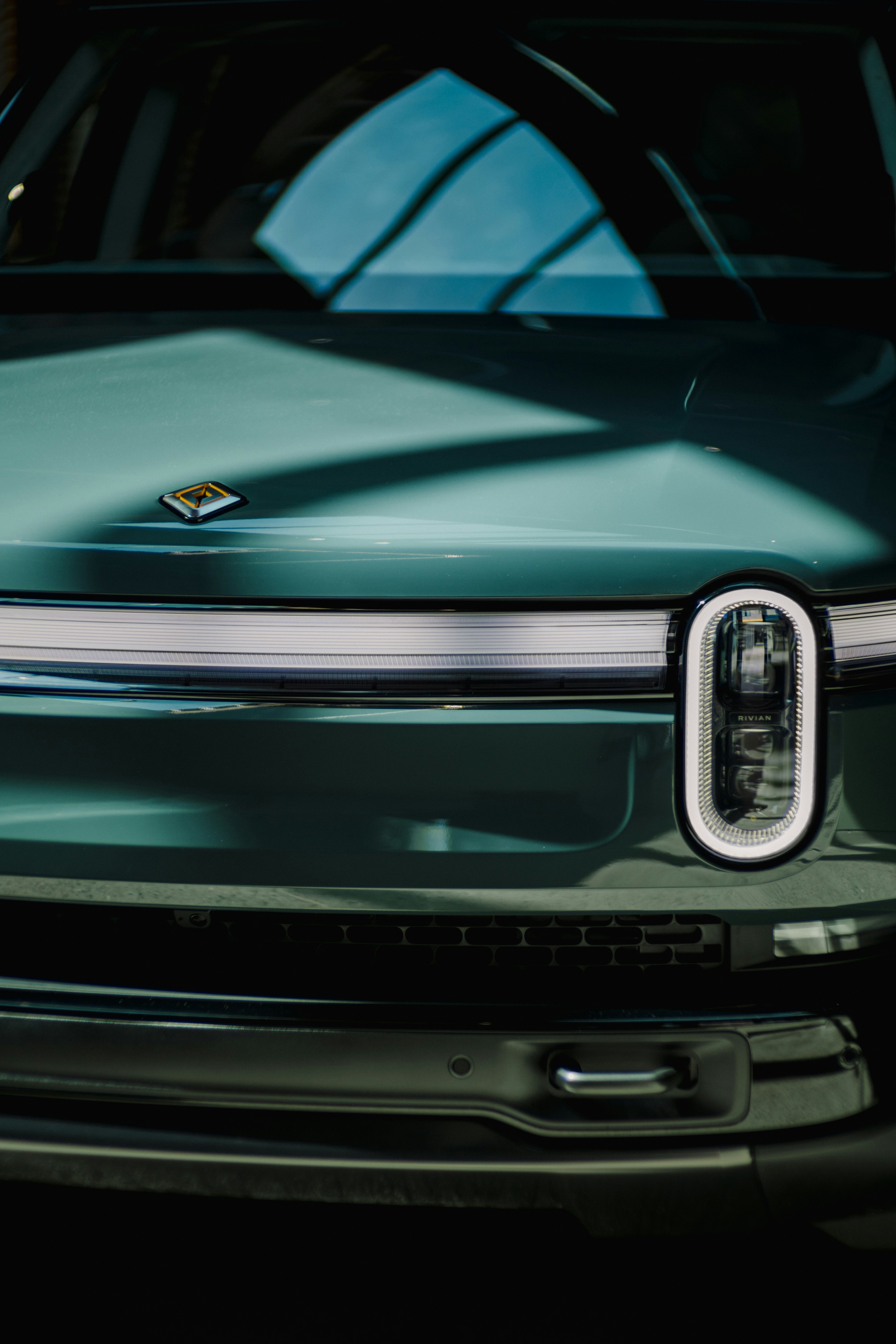 Emerald Grille: Close-up of a Classic Car's Front End