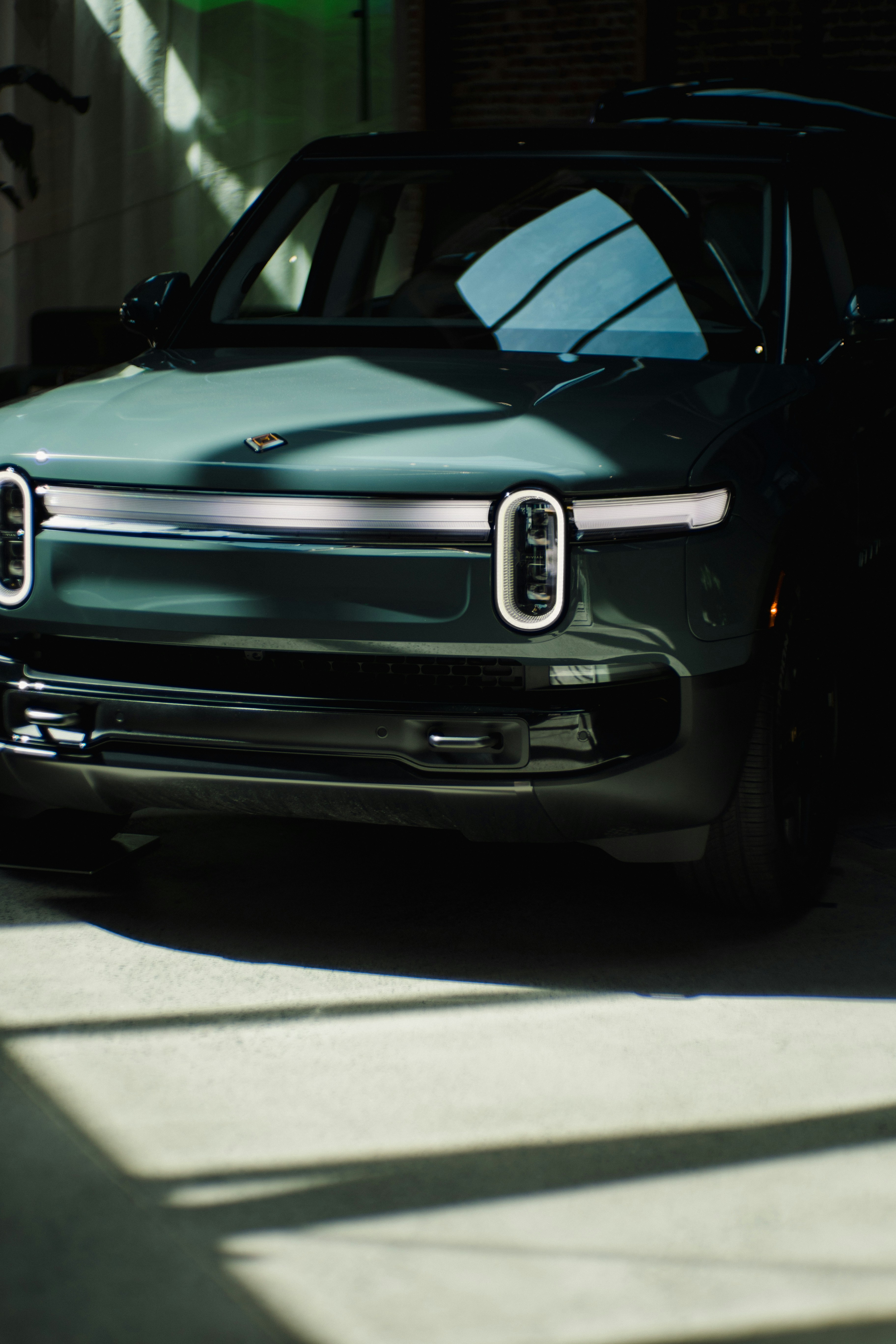 Emerald Grille: A Waiting Moment with Neon-tinted Steel