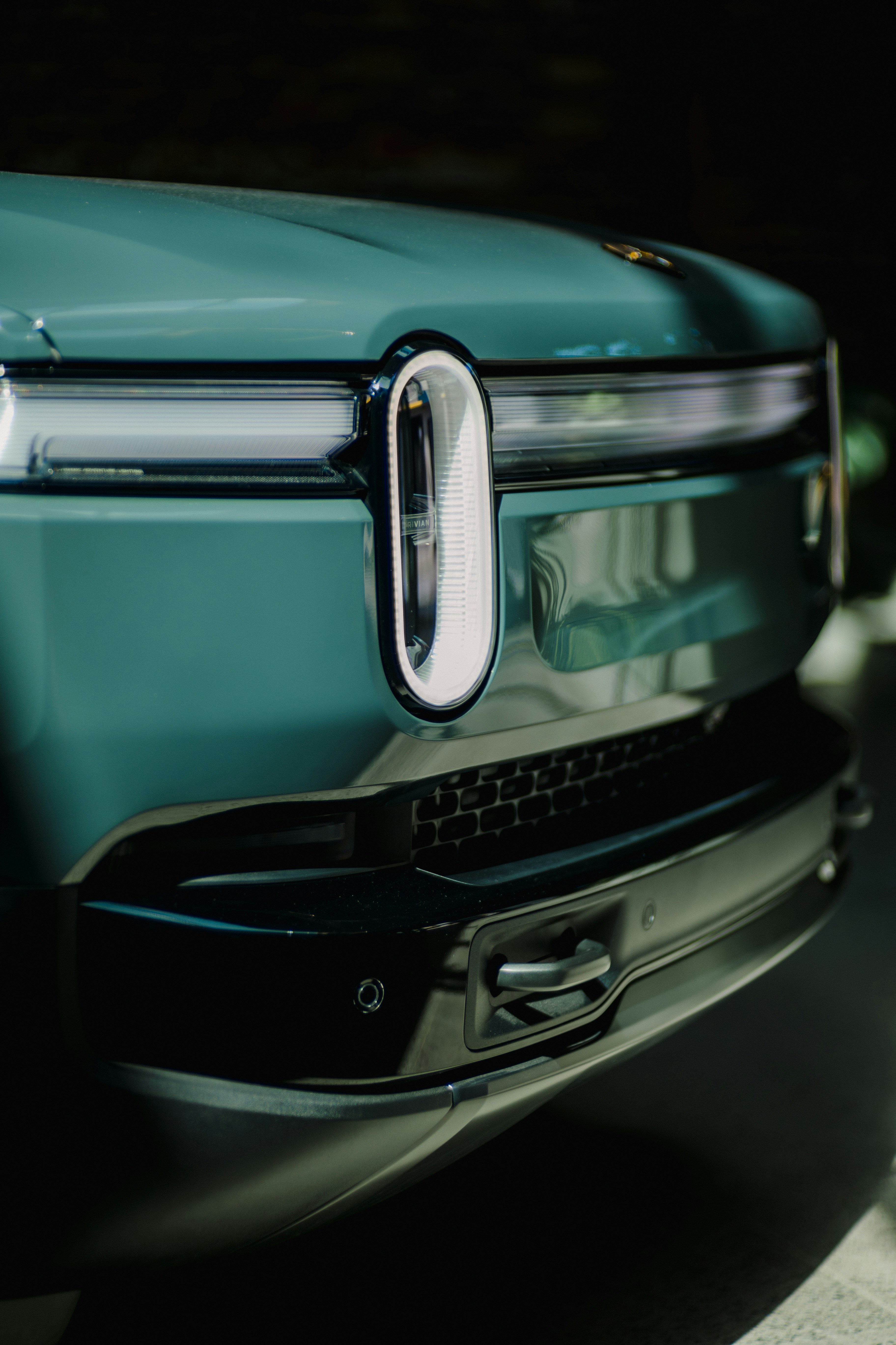 Turquoise Light: The Front Facade of a Bold Modern Truck