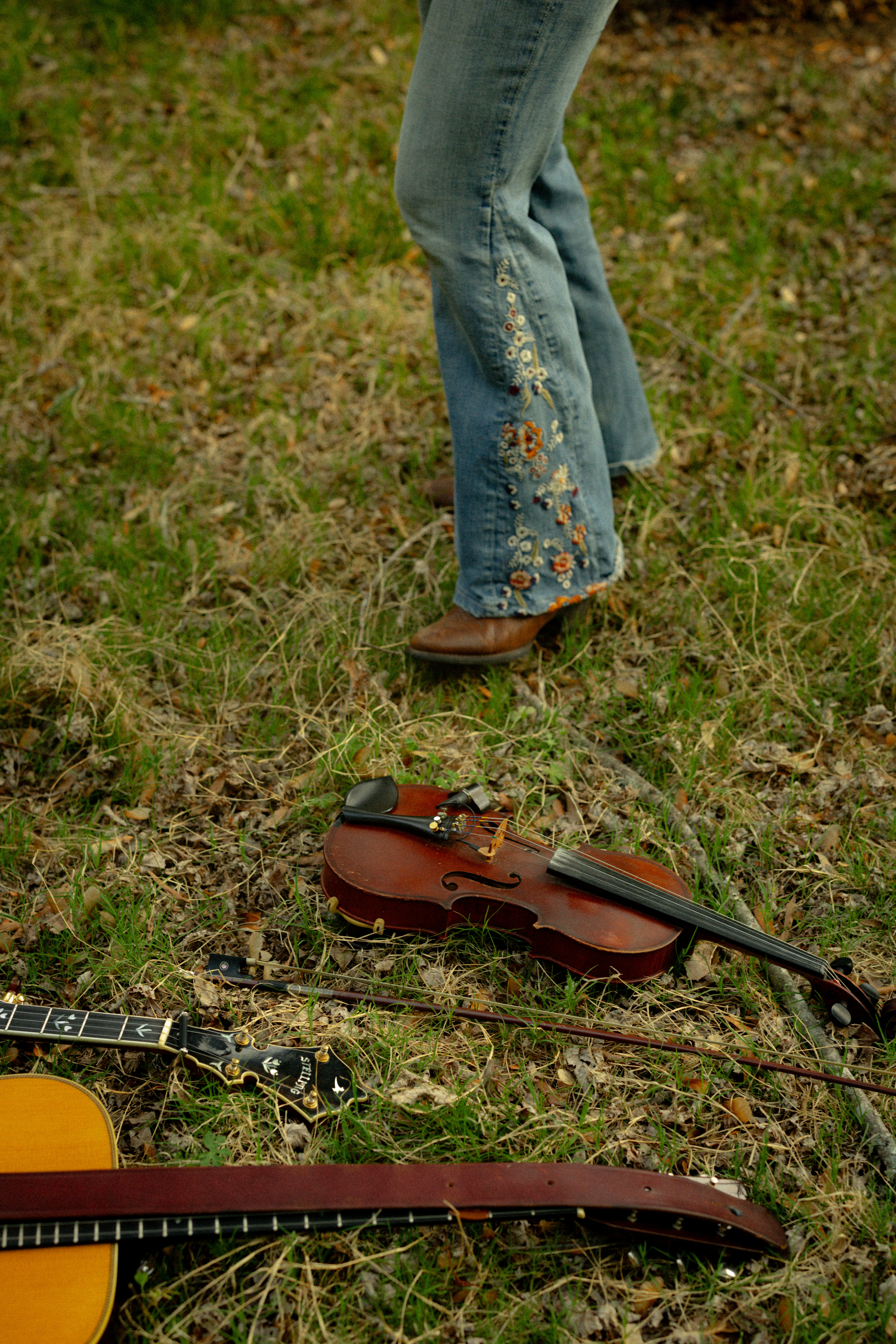 Barefoot in the Grass: A Violin Resting by the Trail