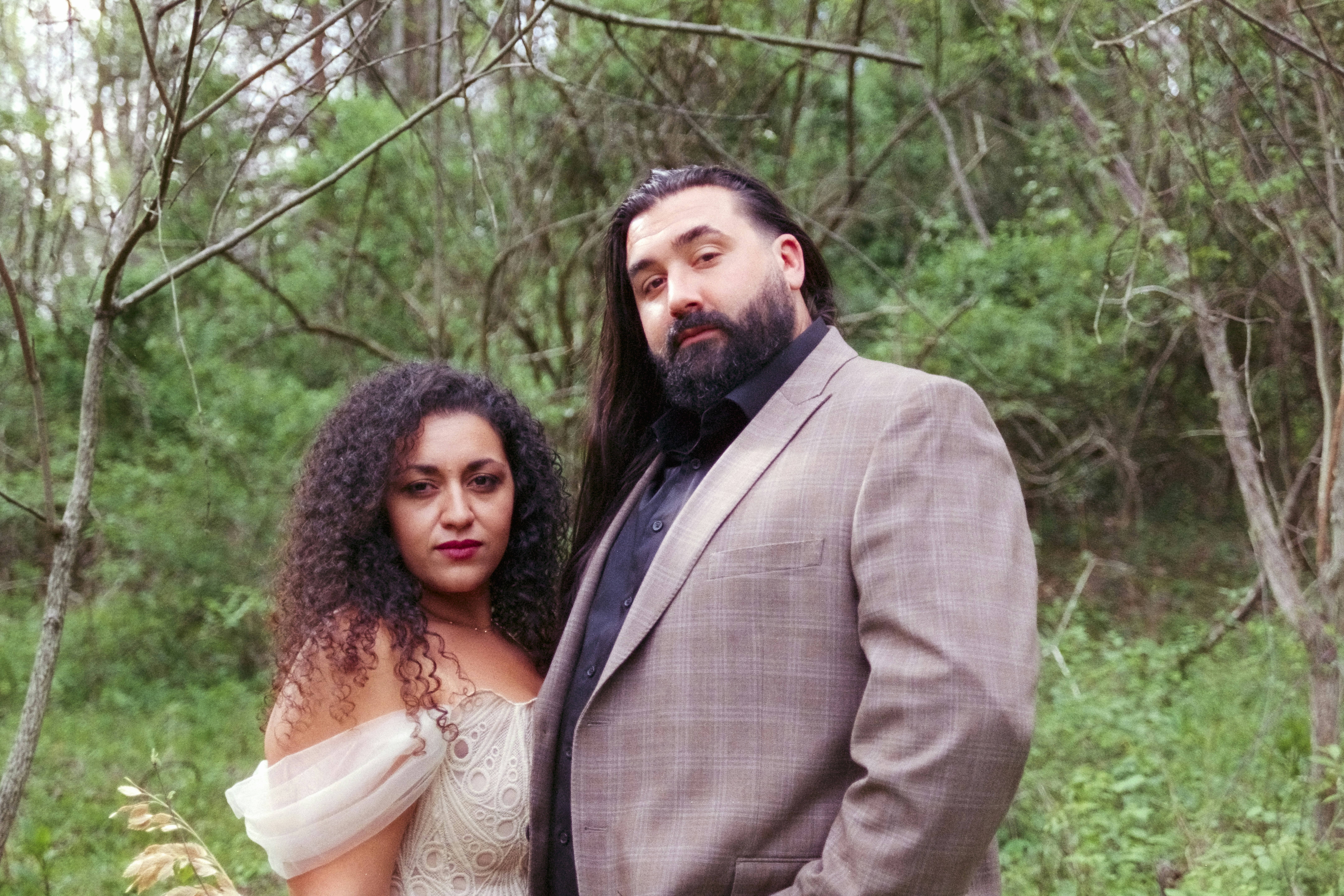 Two Portraits in a Quiet Forest: A Bride and Groom Stance