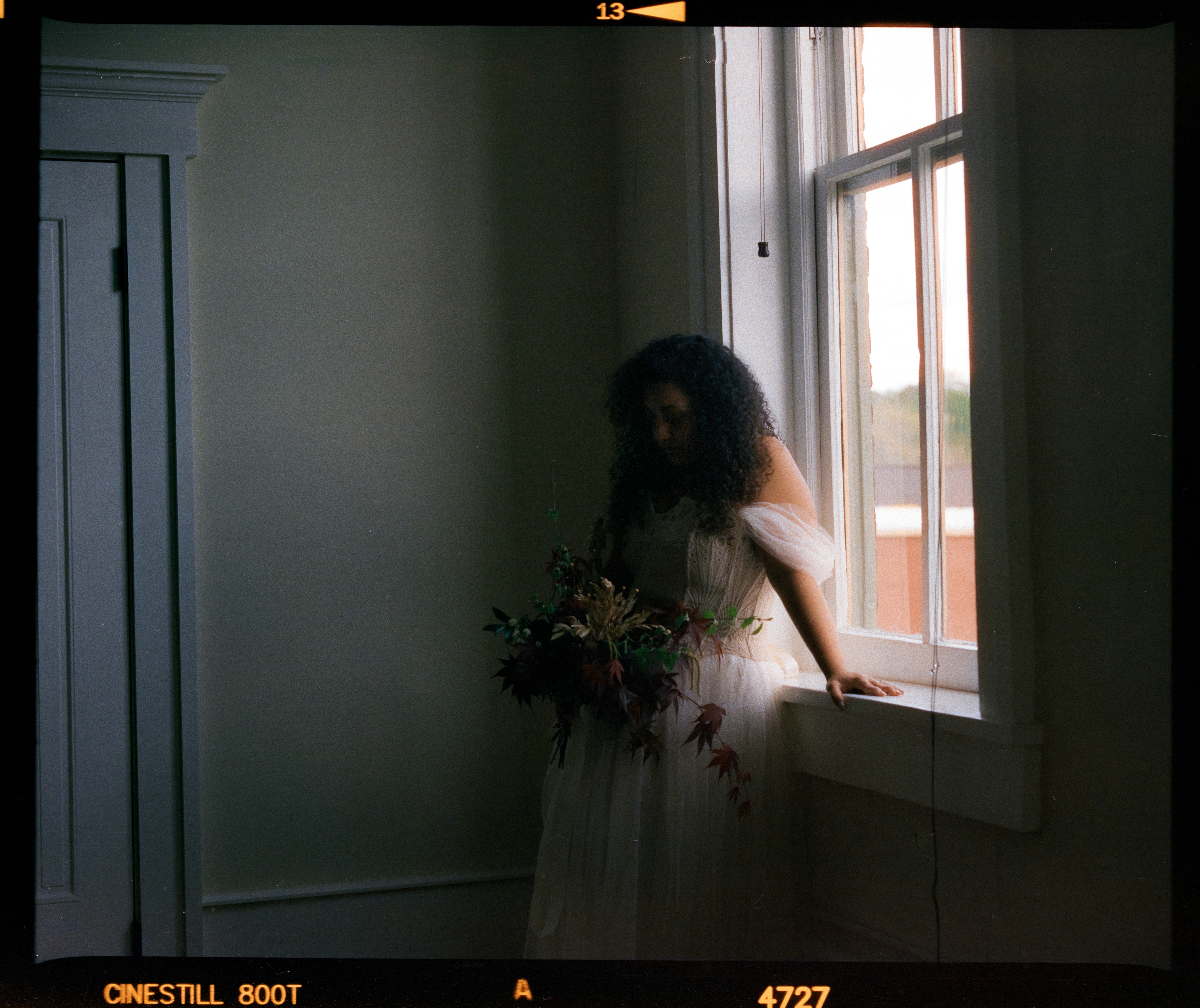 Bride by the Window: A Quiet Portrait in Soft Light