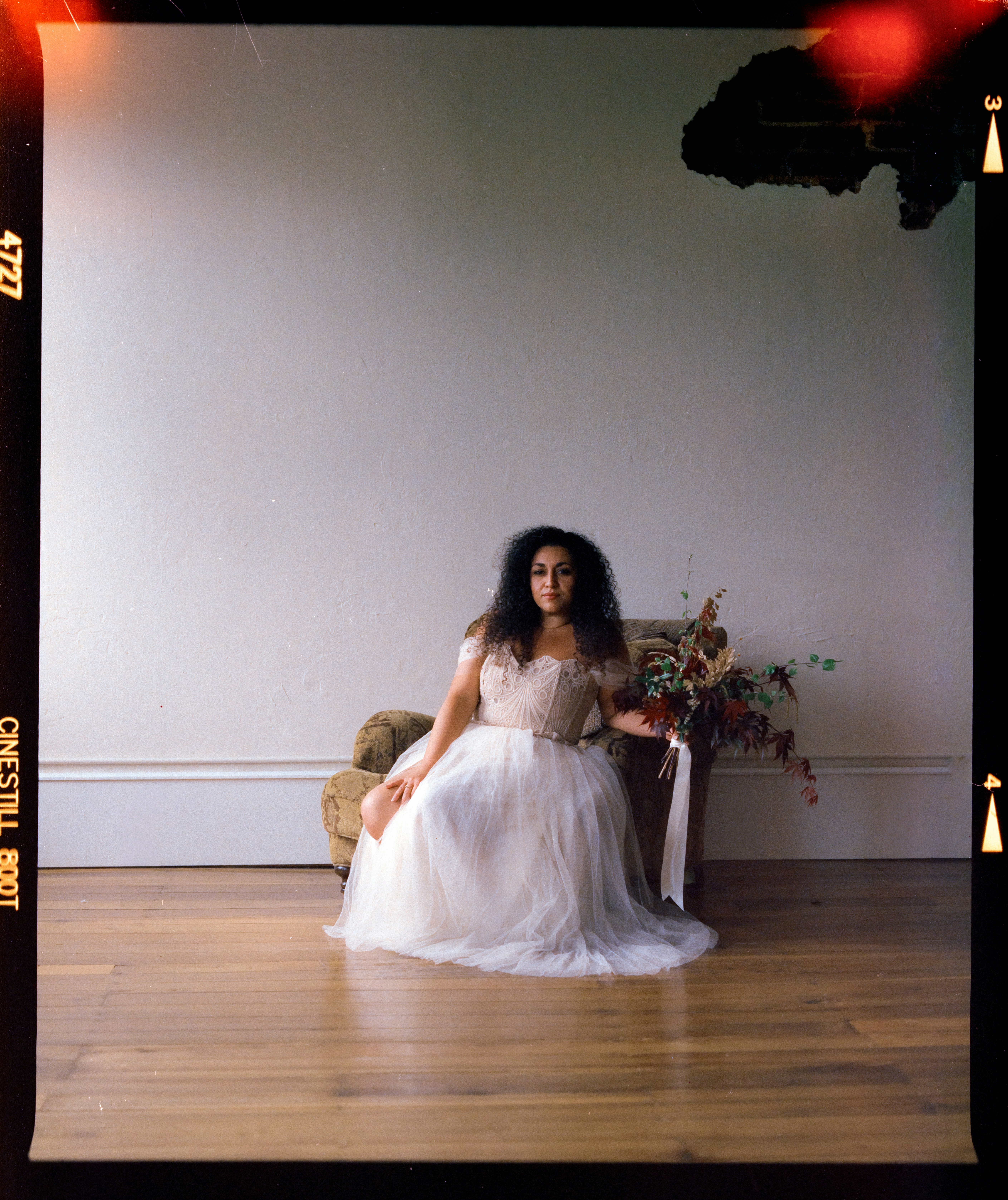 Bride in Soft Tulle: Portrait on a Quiet Studio Stage
