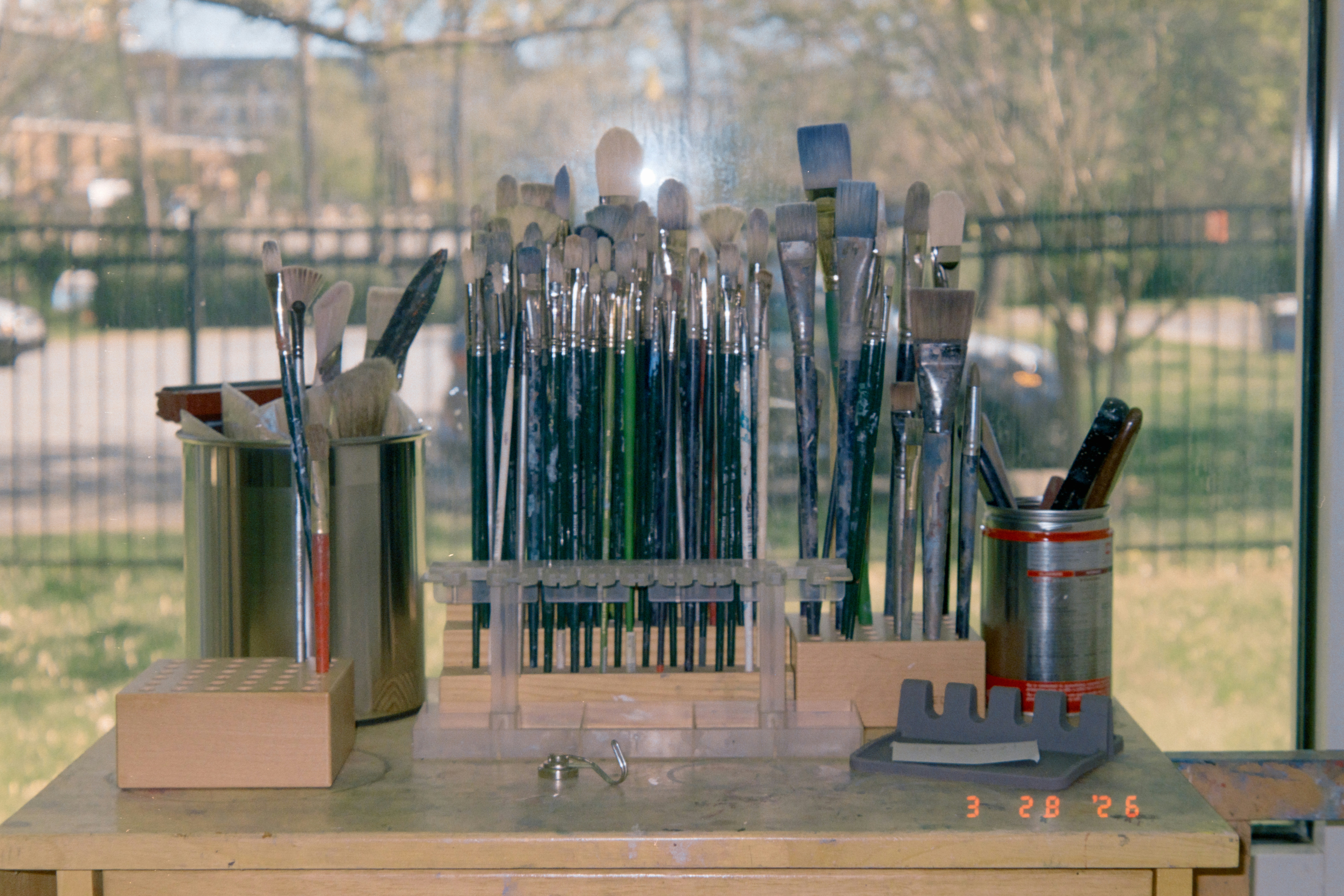 Studio Bench with Brushes: A Quiet Morning in Natural Light