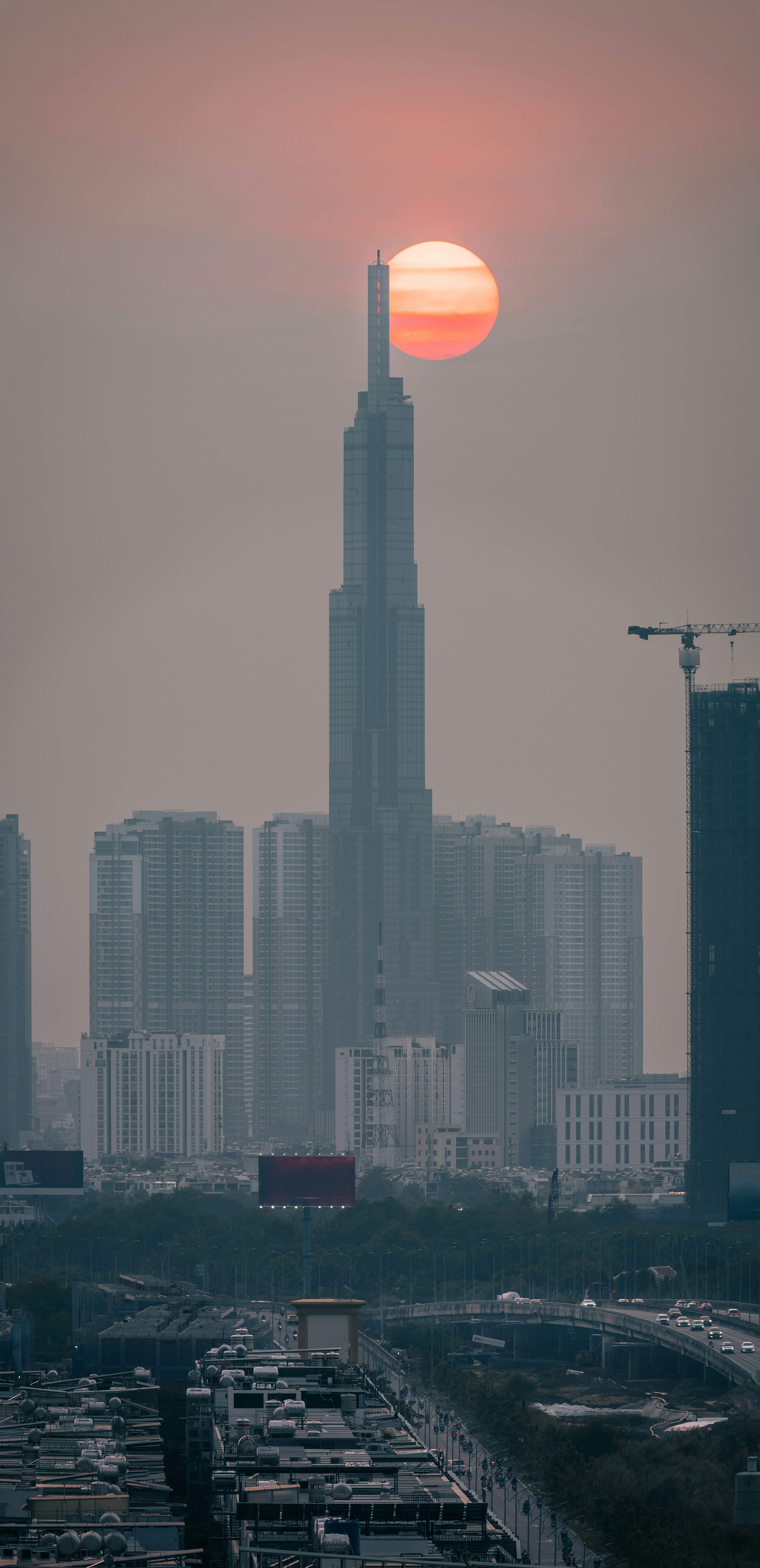 Sunset on the Spire: A City Quiet Under Peach Light