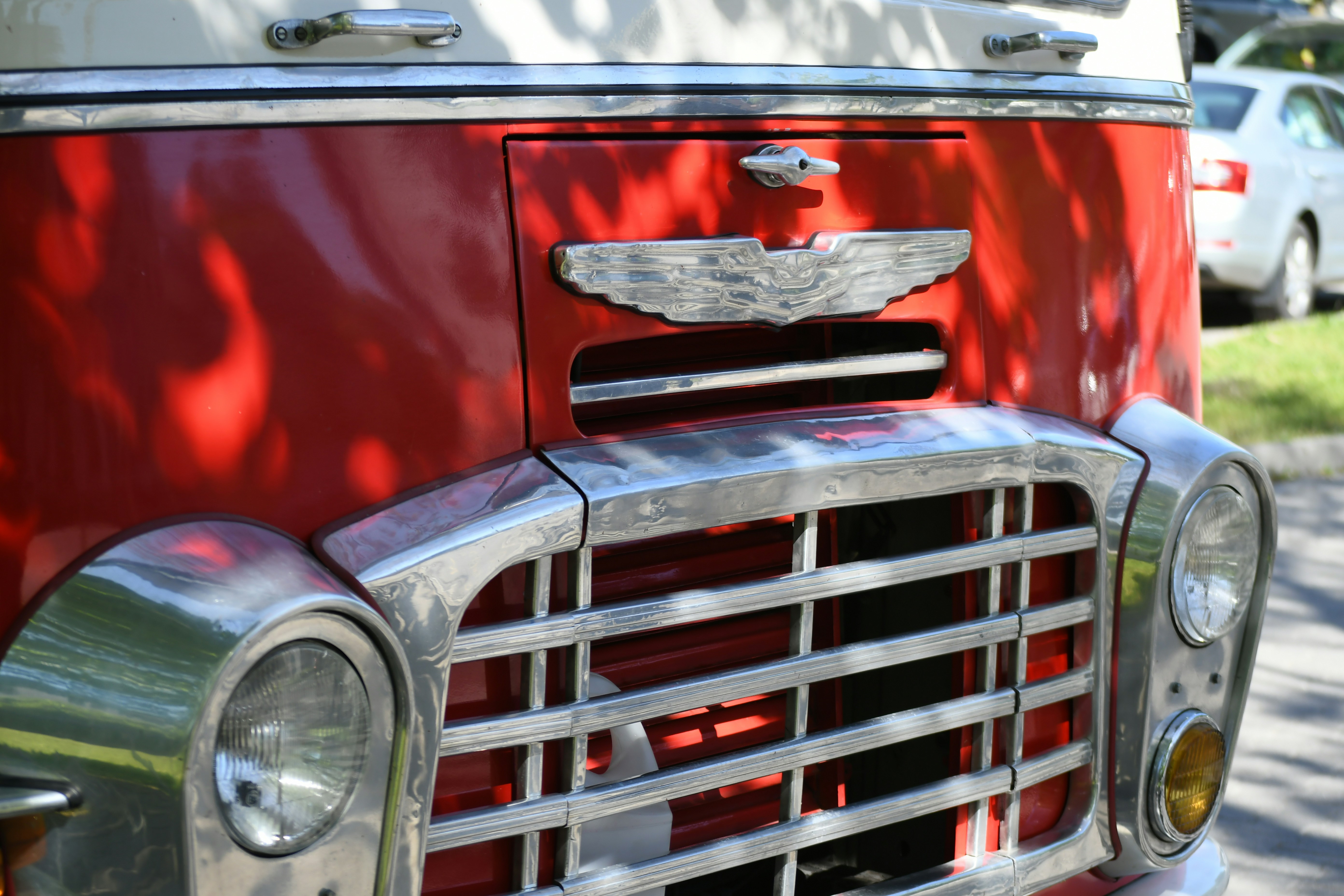 Crimson Grille: A Classic Red Farm Truck in Focus