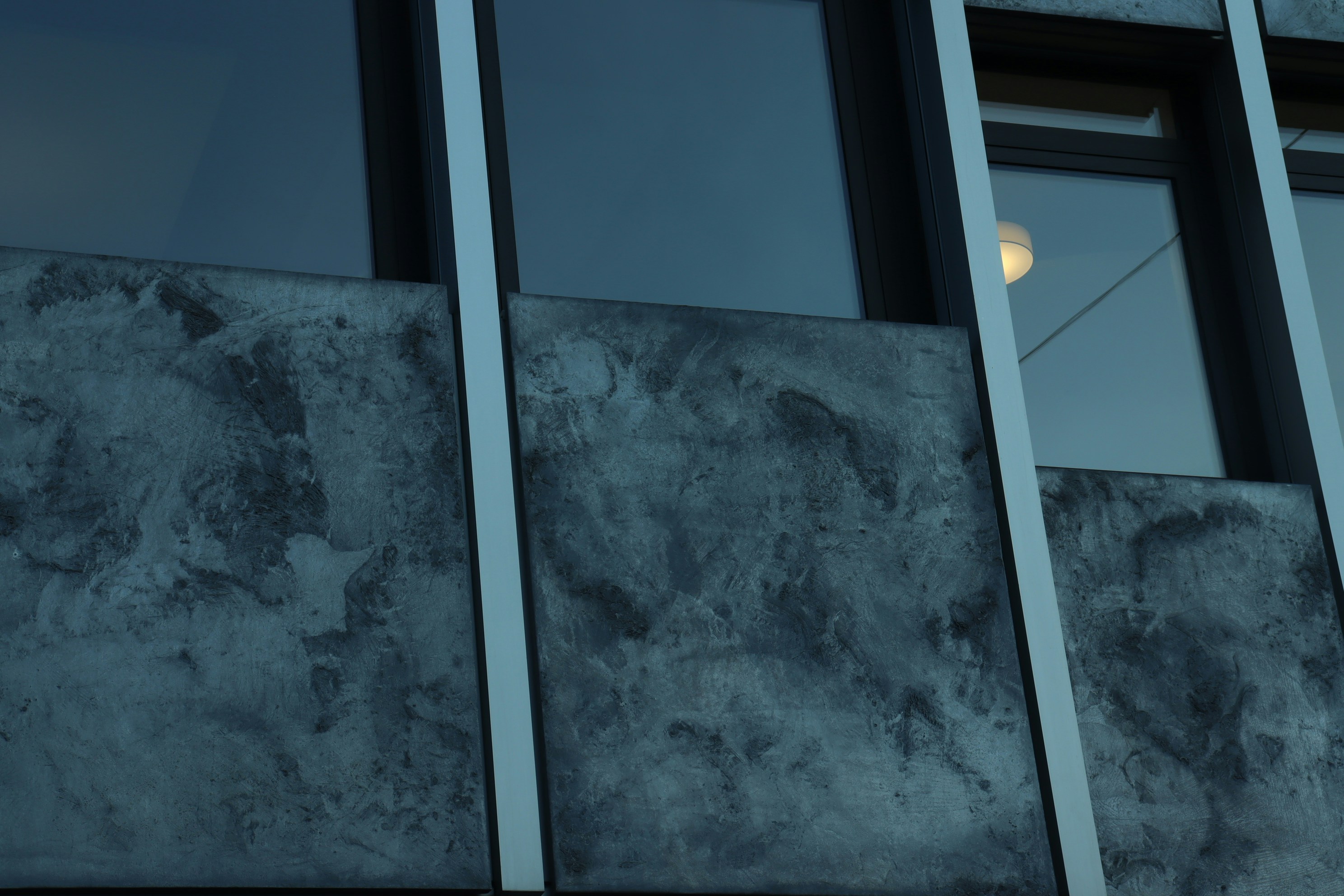 Concrete Facade Between Glazed Strips