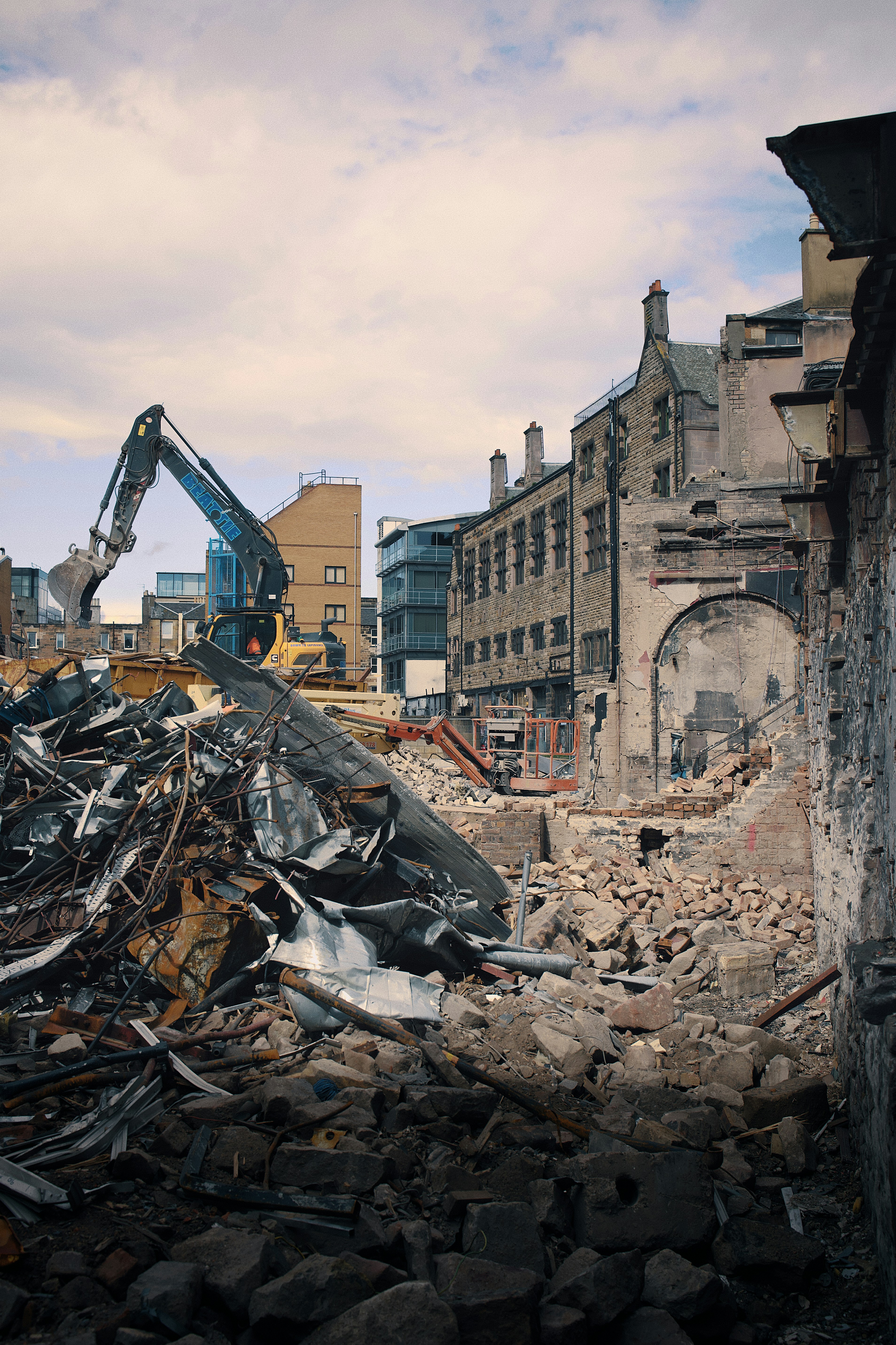 Rubble and Crane at Dusk: A City Construction Scene in Motion
