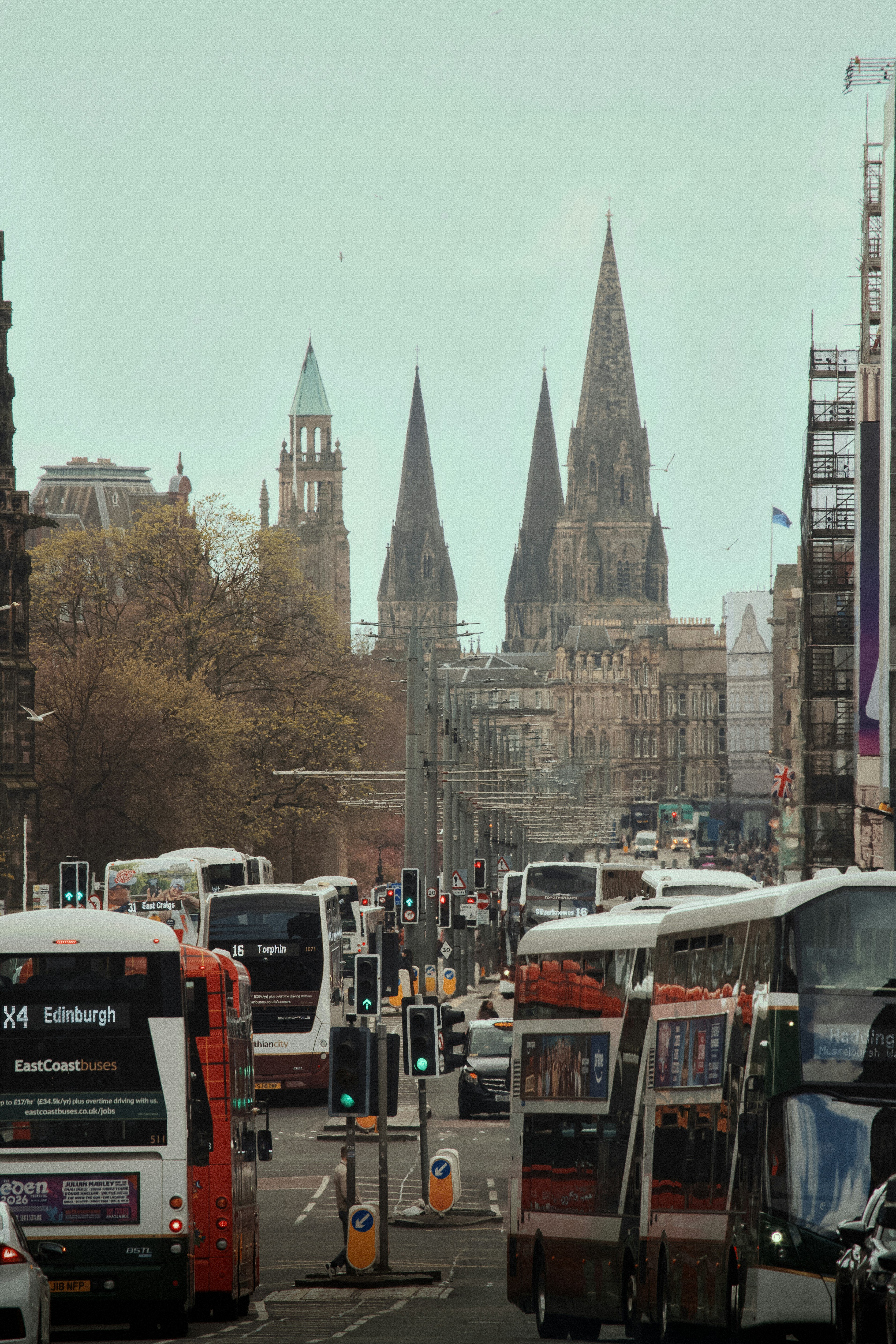 Twin Spires Over the Madding Traffic: A Glasgow-esque City Street Scene