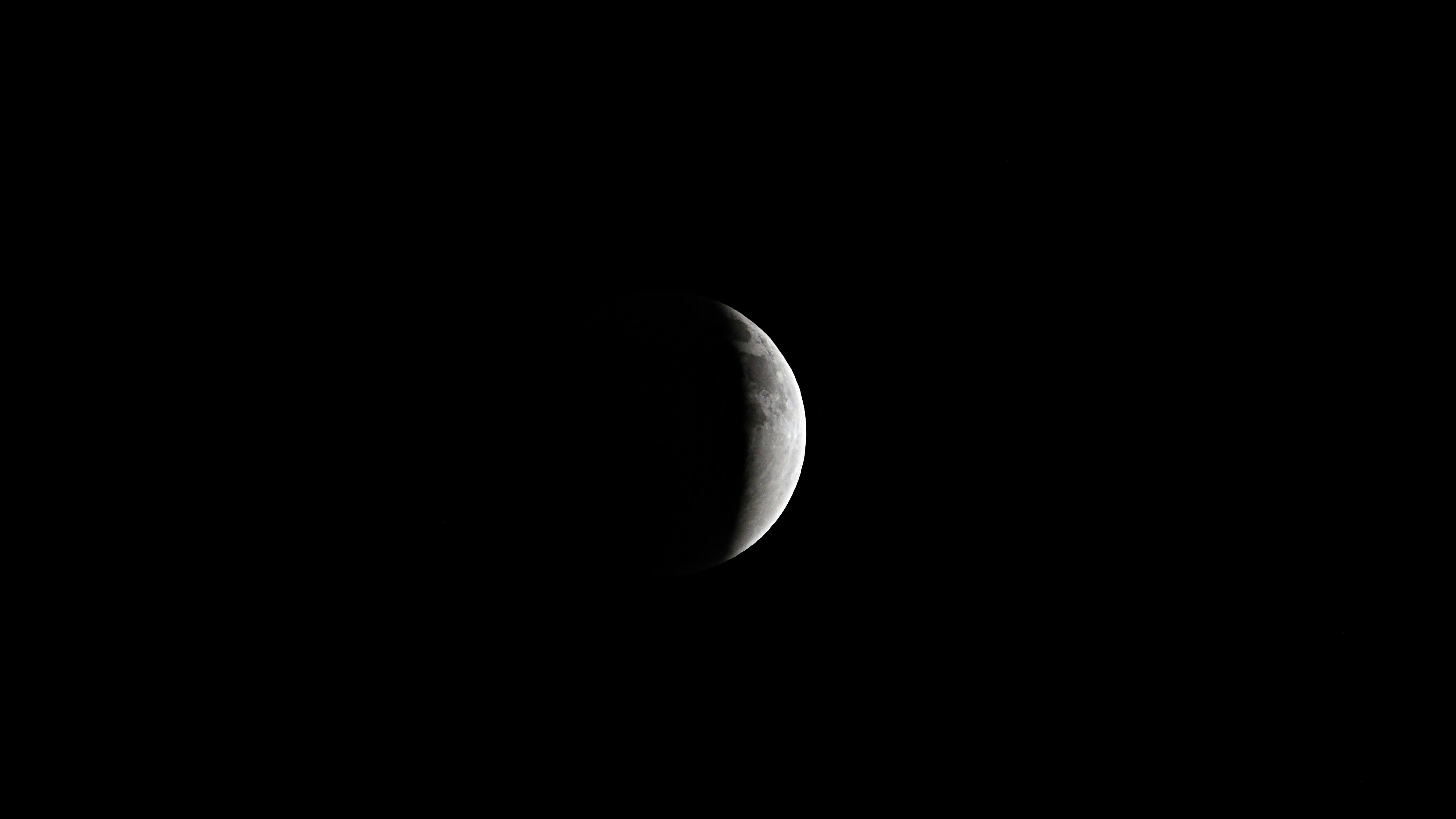 Quiet Crescent: A Moon in Earth’s Shadow