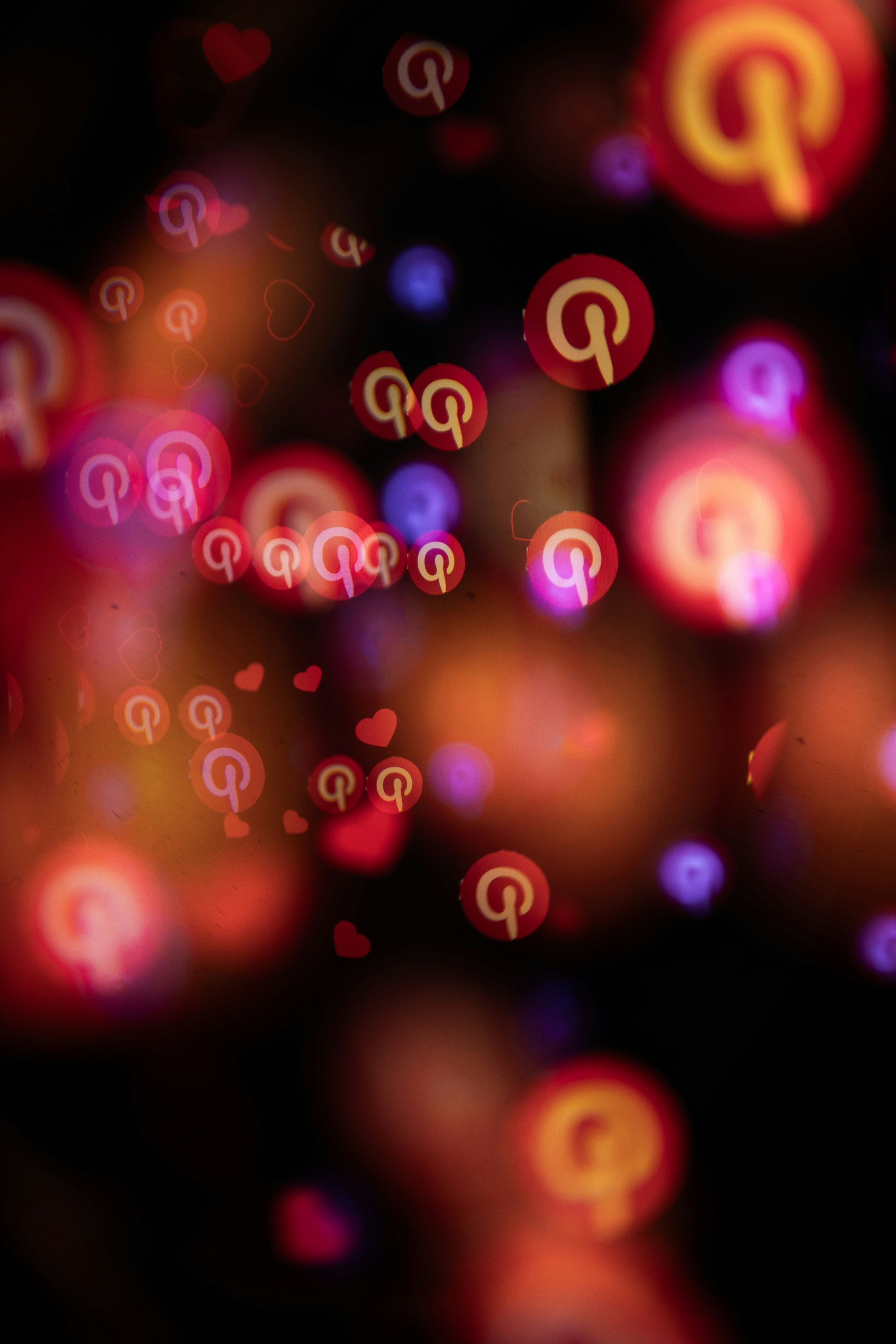 Bokeh Constellation: Neon Hearts and Spirals in a Night Orchard