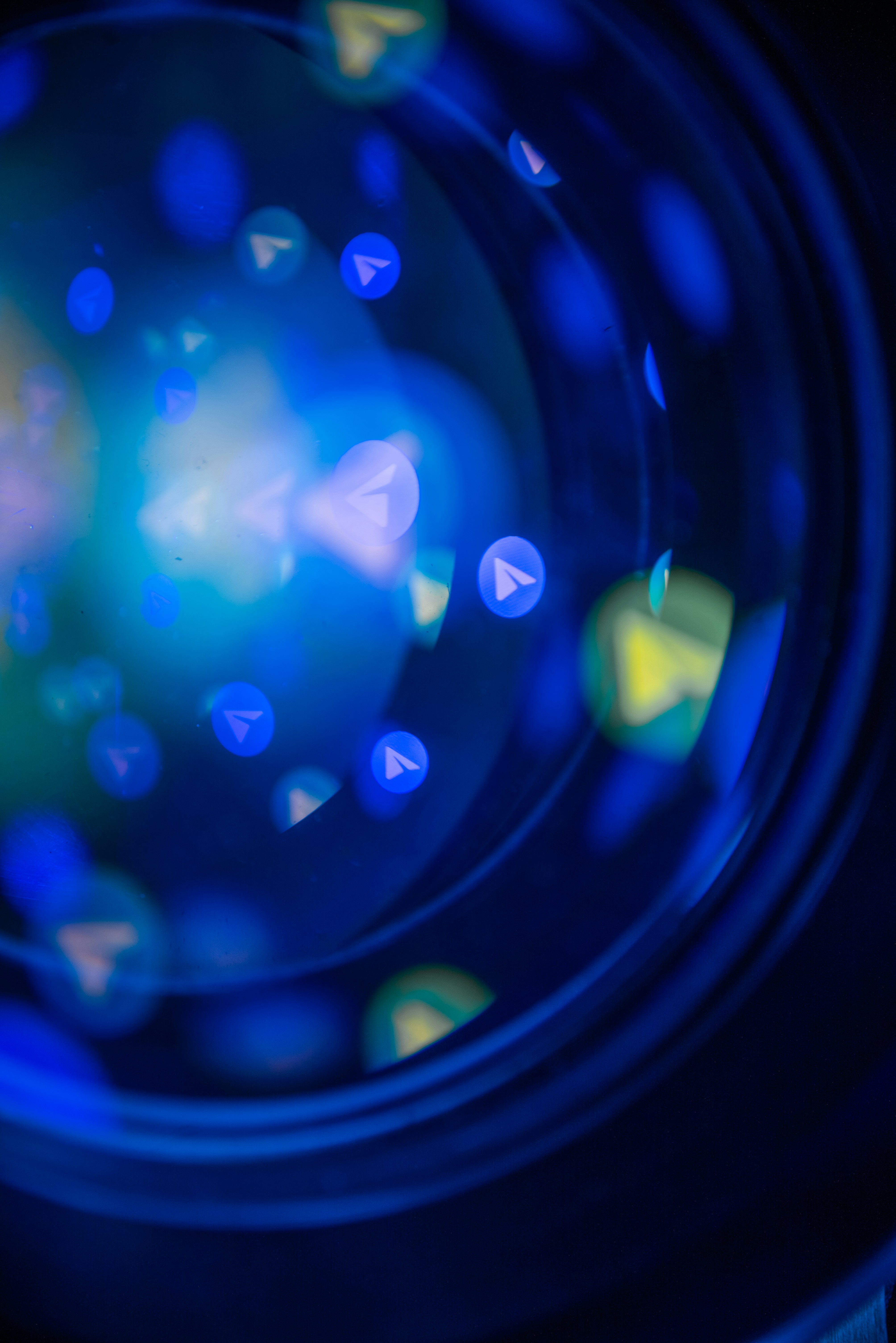 Lens Bloom: Abstract Blue Orbs Through a Distant Glass