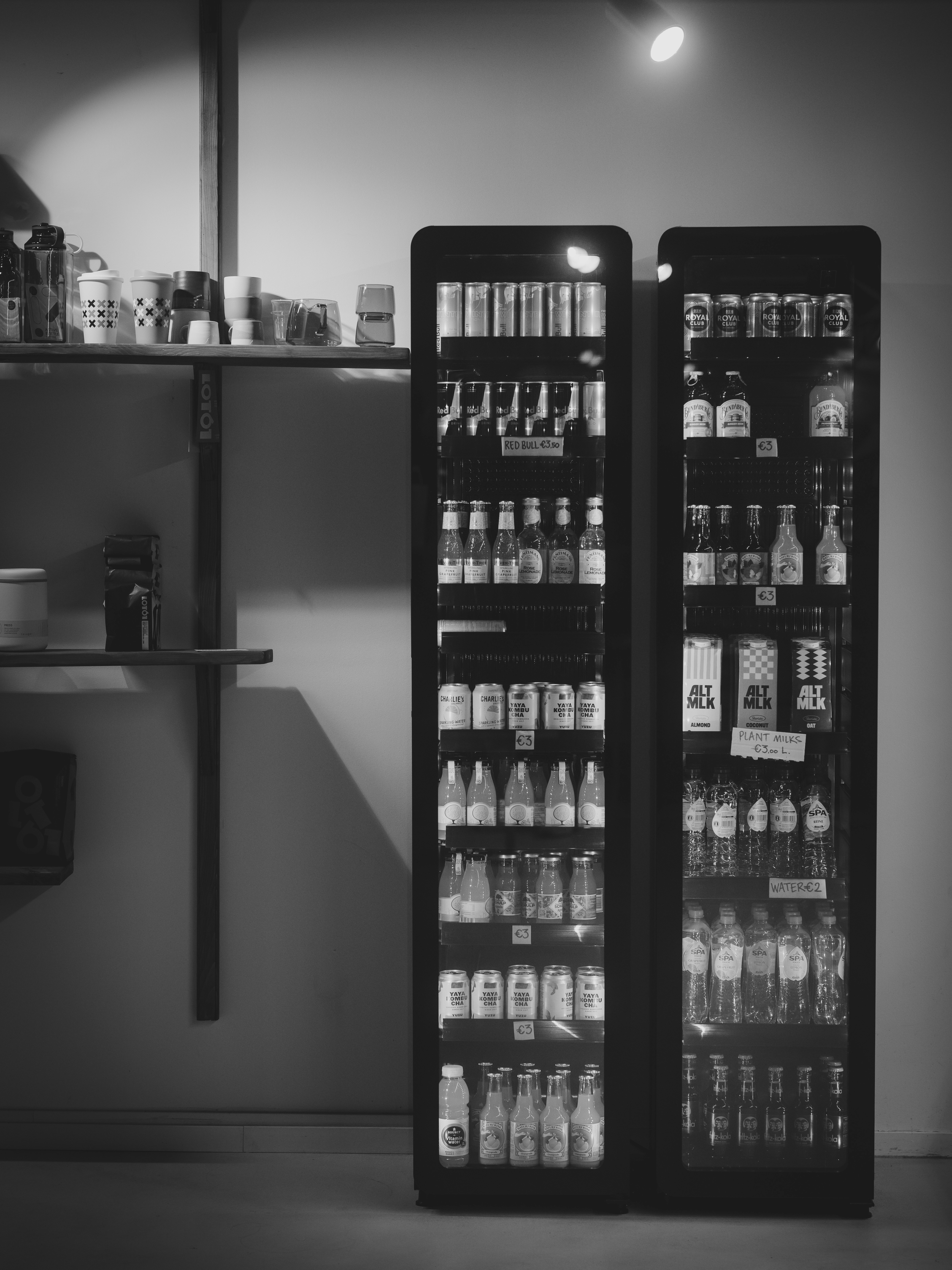 Quiet Aisle: Framed Refrigeration in Monochrome
