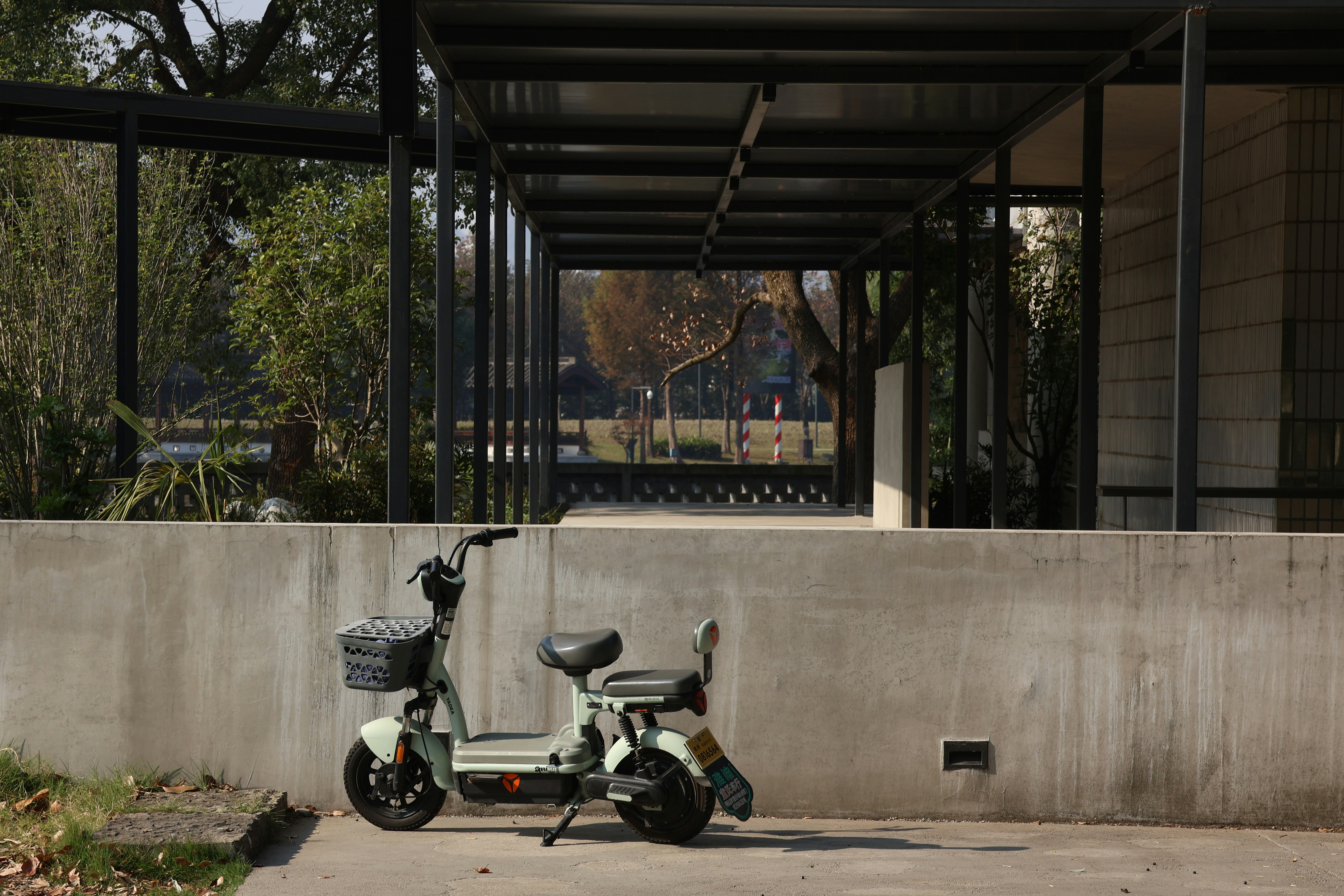 E-bike Rest at the Edge of a Modern Courtyard