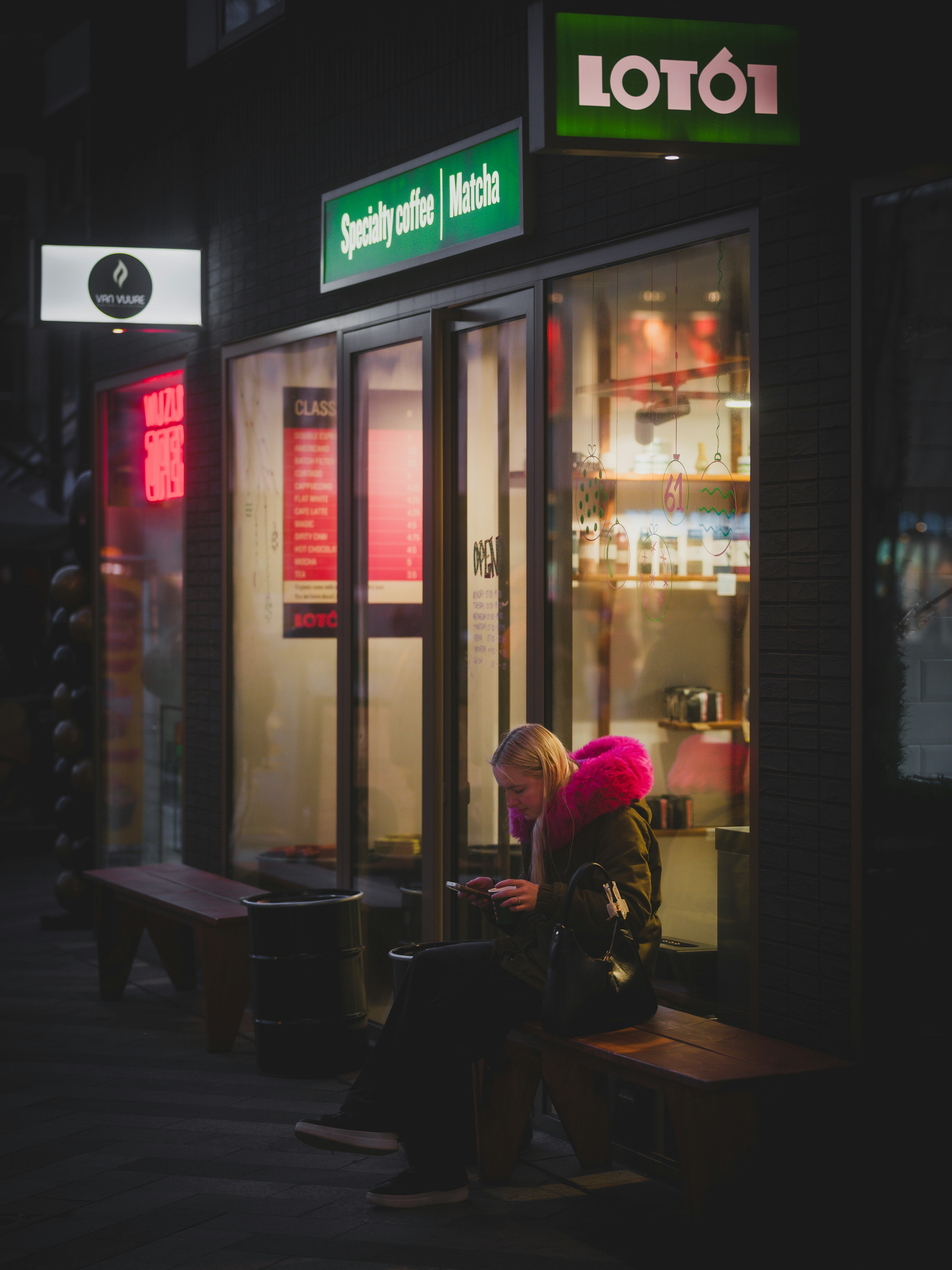 Night Street Café: Headphones, Coffee, and Neon Silence