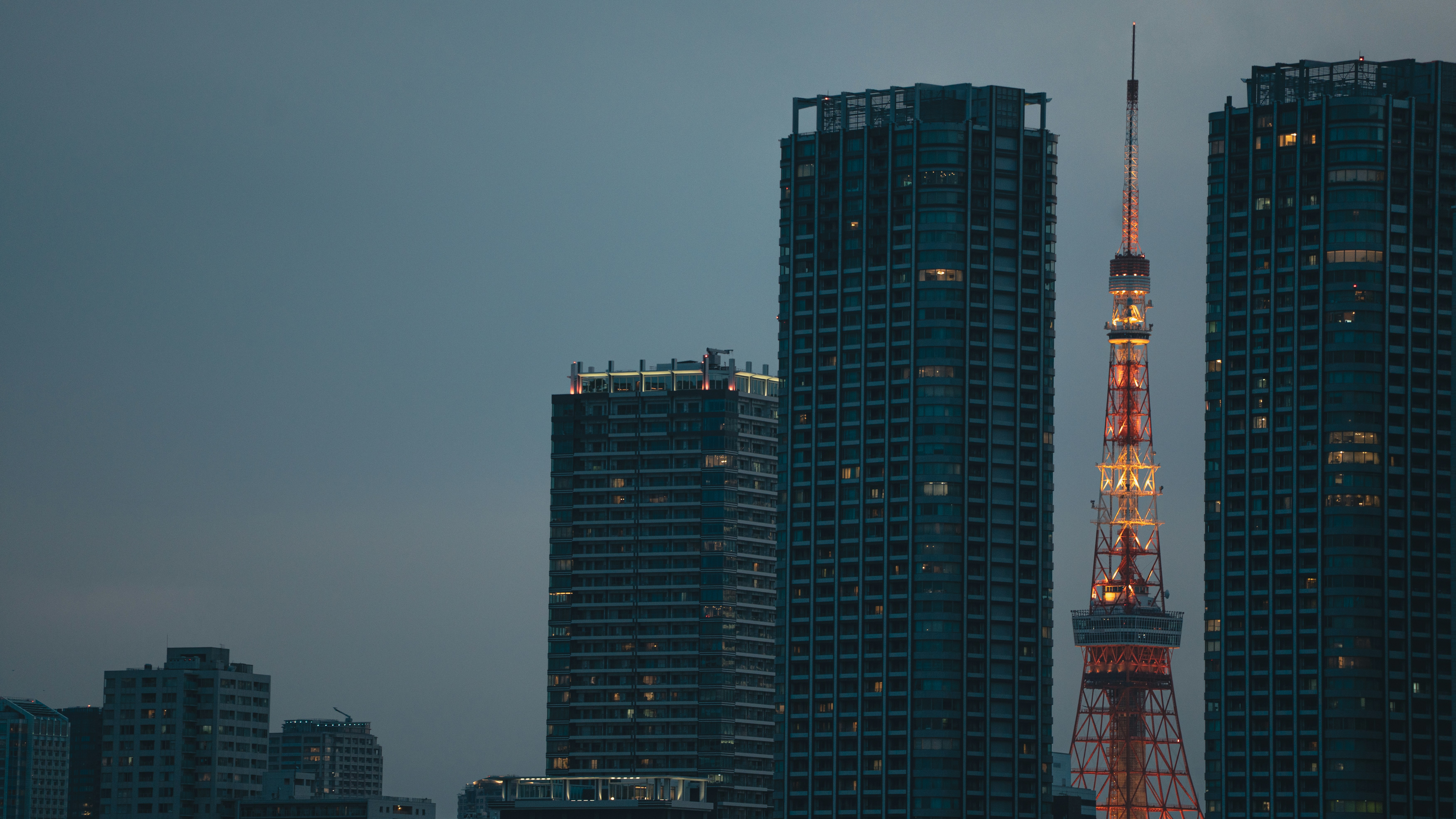 Tokyo-esque Tower Sunrise: Neon Spire Among Skyscrapers