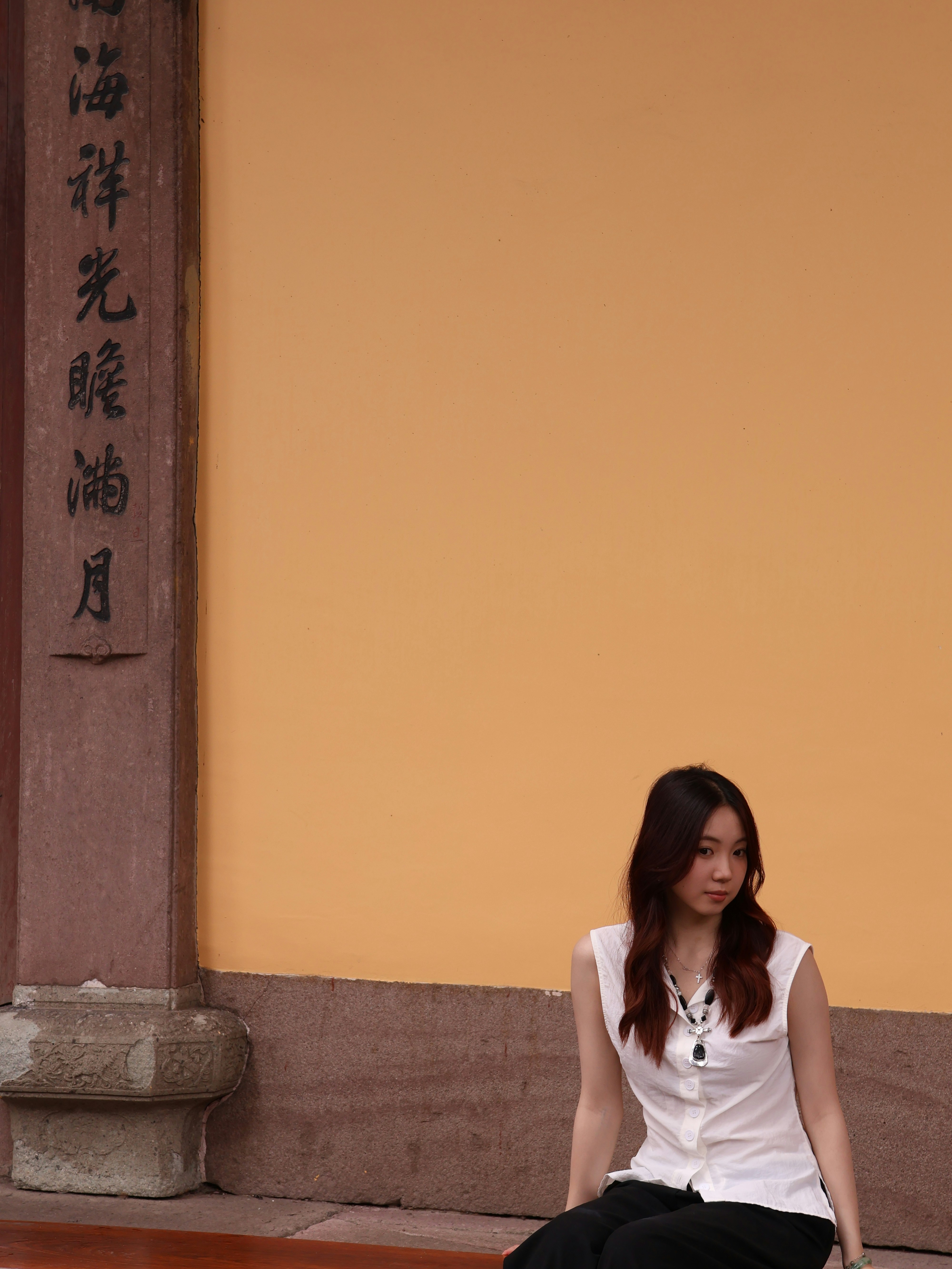 Quiet Confidence by the Golden Wall