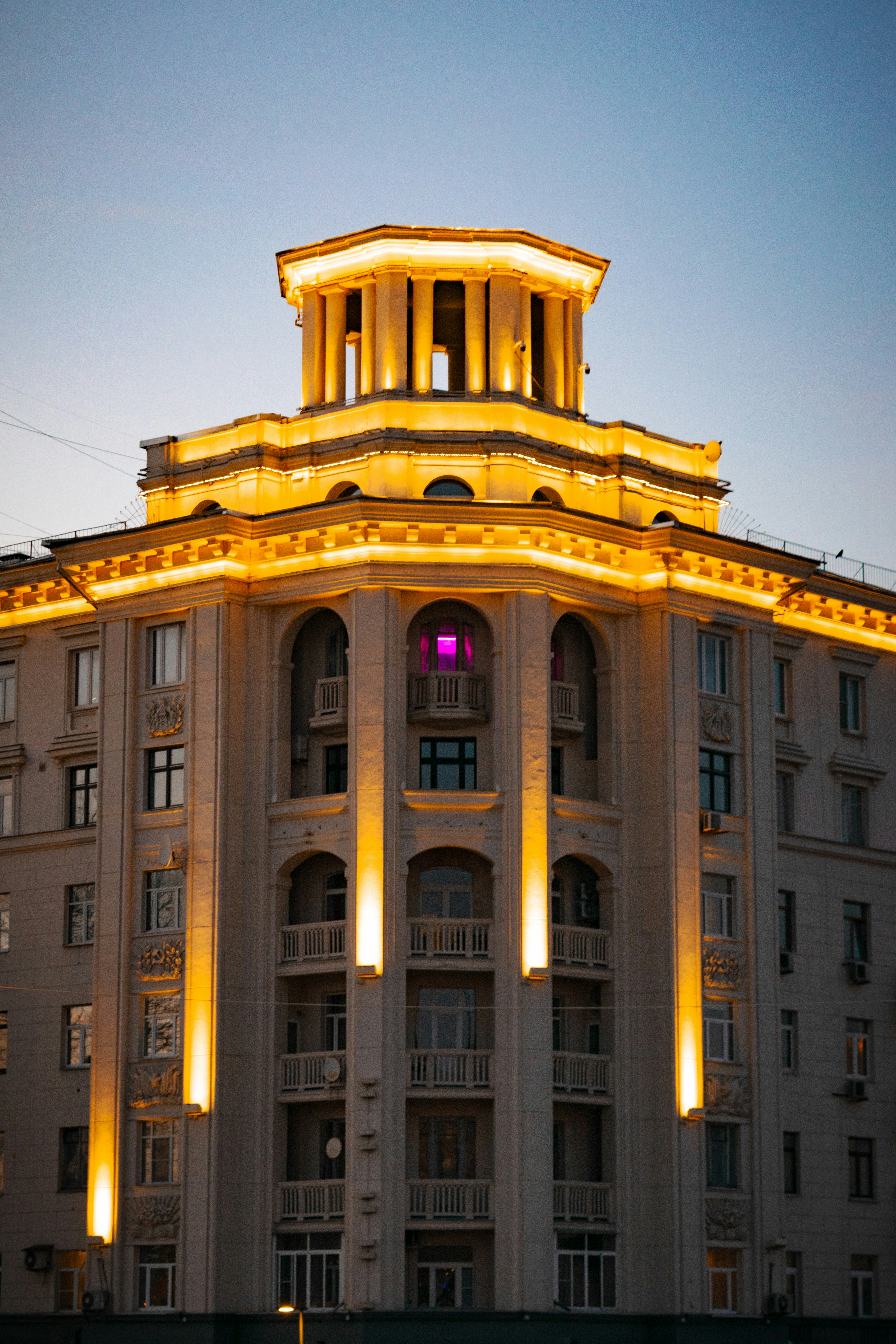 Luminous Crown: An Urban Temple Adorned in Evening Light