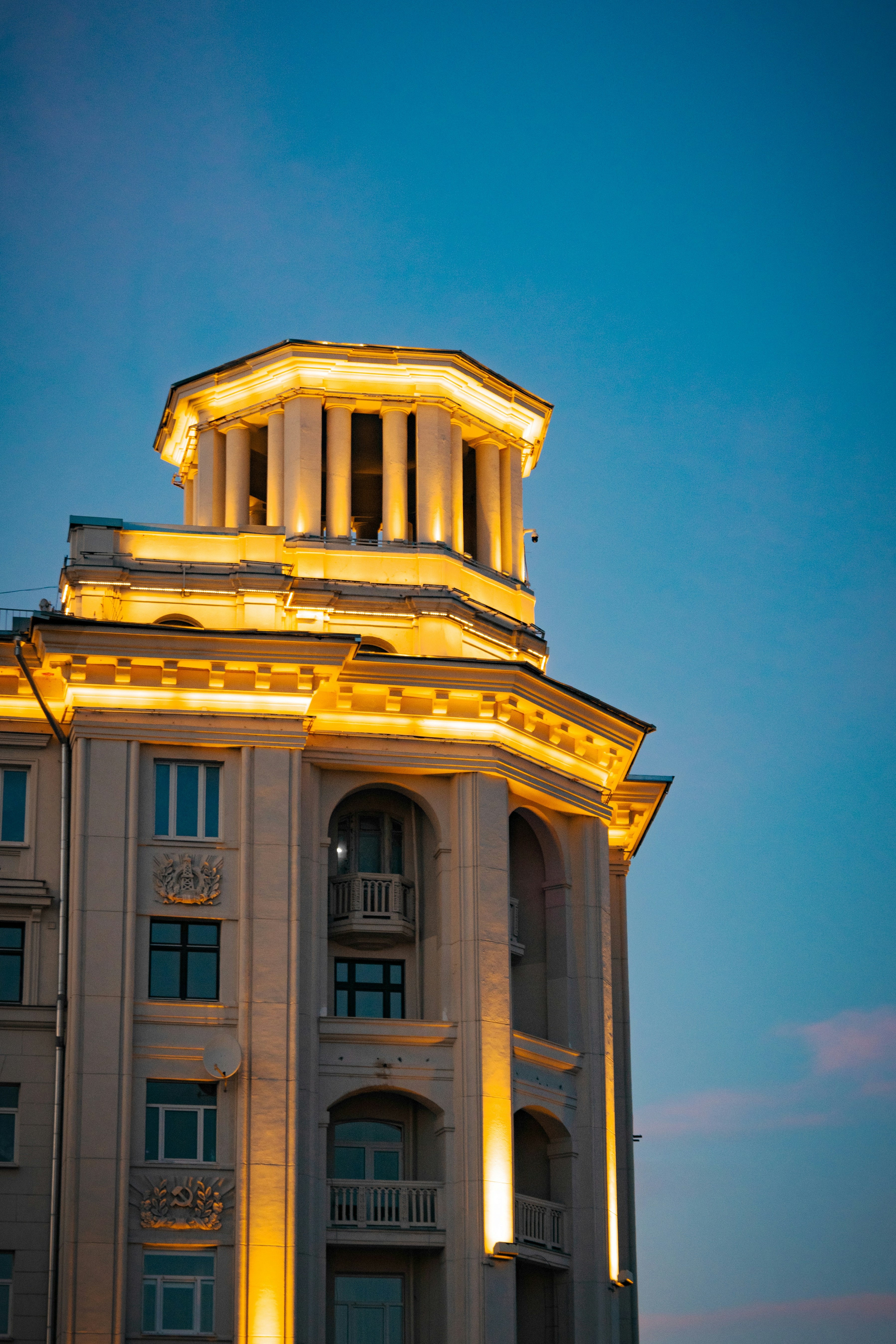 Golden Facade at Dusk: A Neo-Classical Landmark Bathed in Warm Light