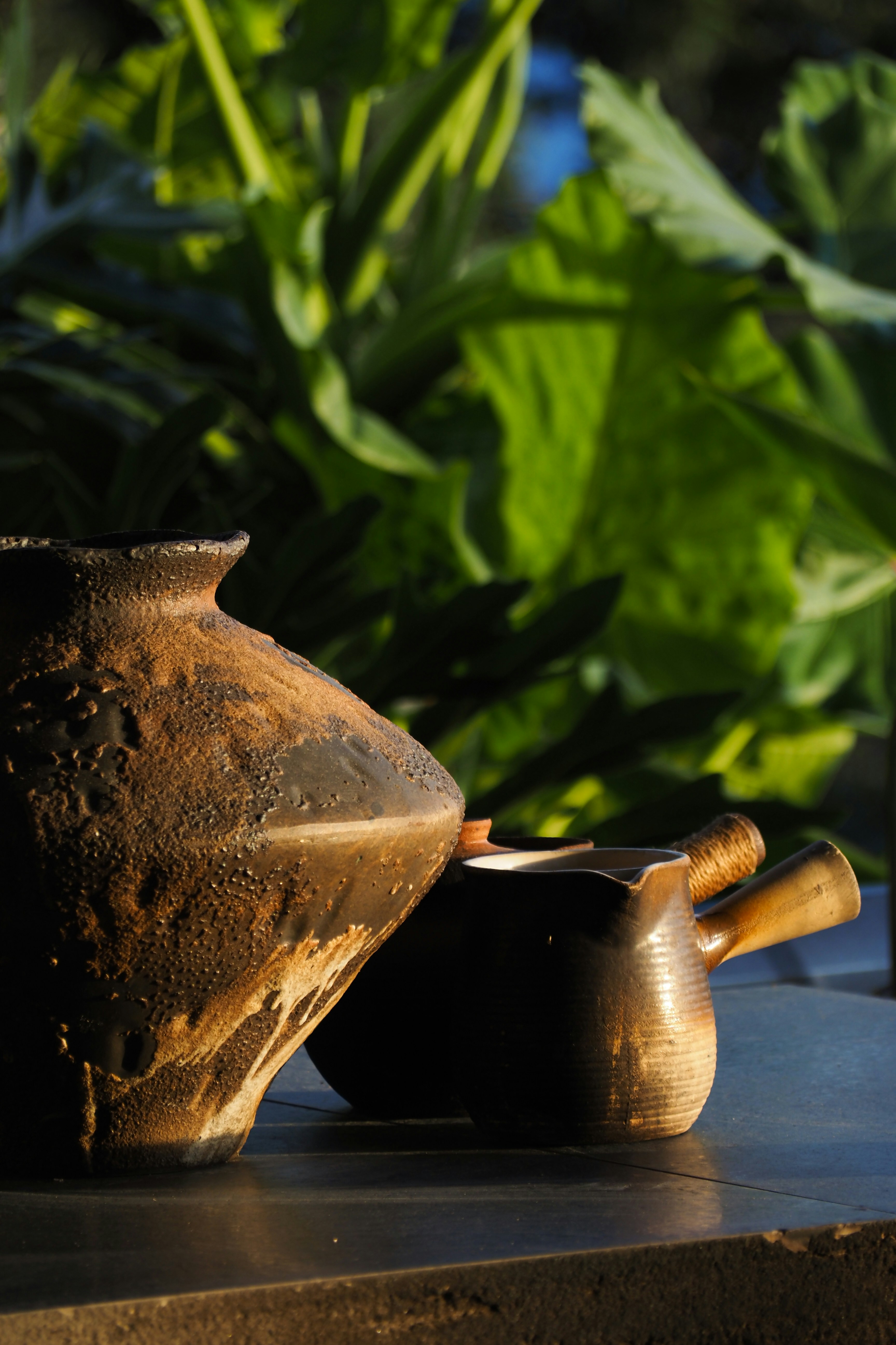 Rust and Steam: A Quiet Still Life with Earthen Jars