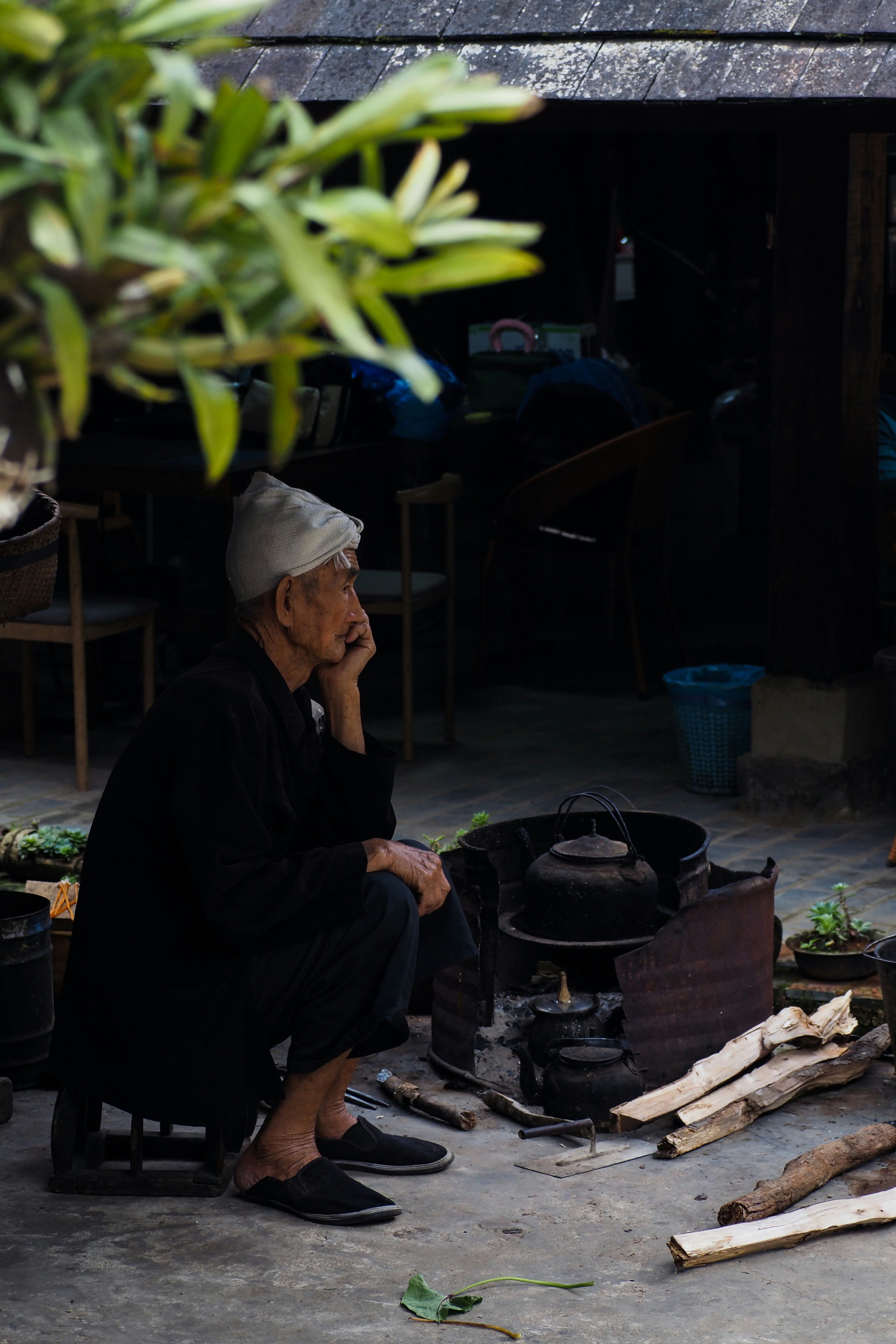 Old Craftsman in Quiet Workshop by the Fire